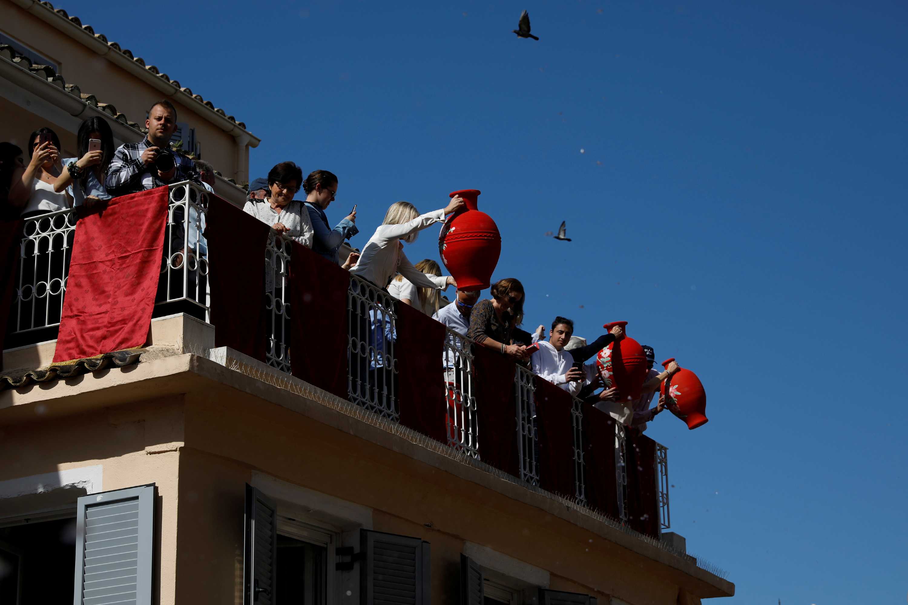 Greek Orthodox Easter: Old tradition of pot-smashing marks religious ...