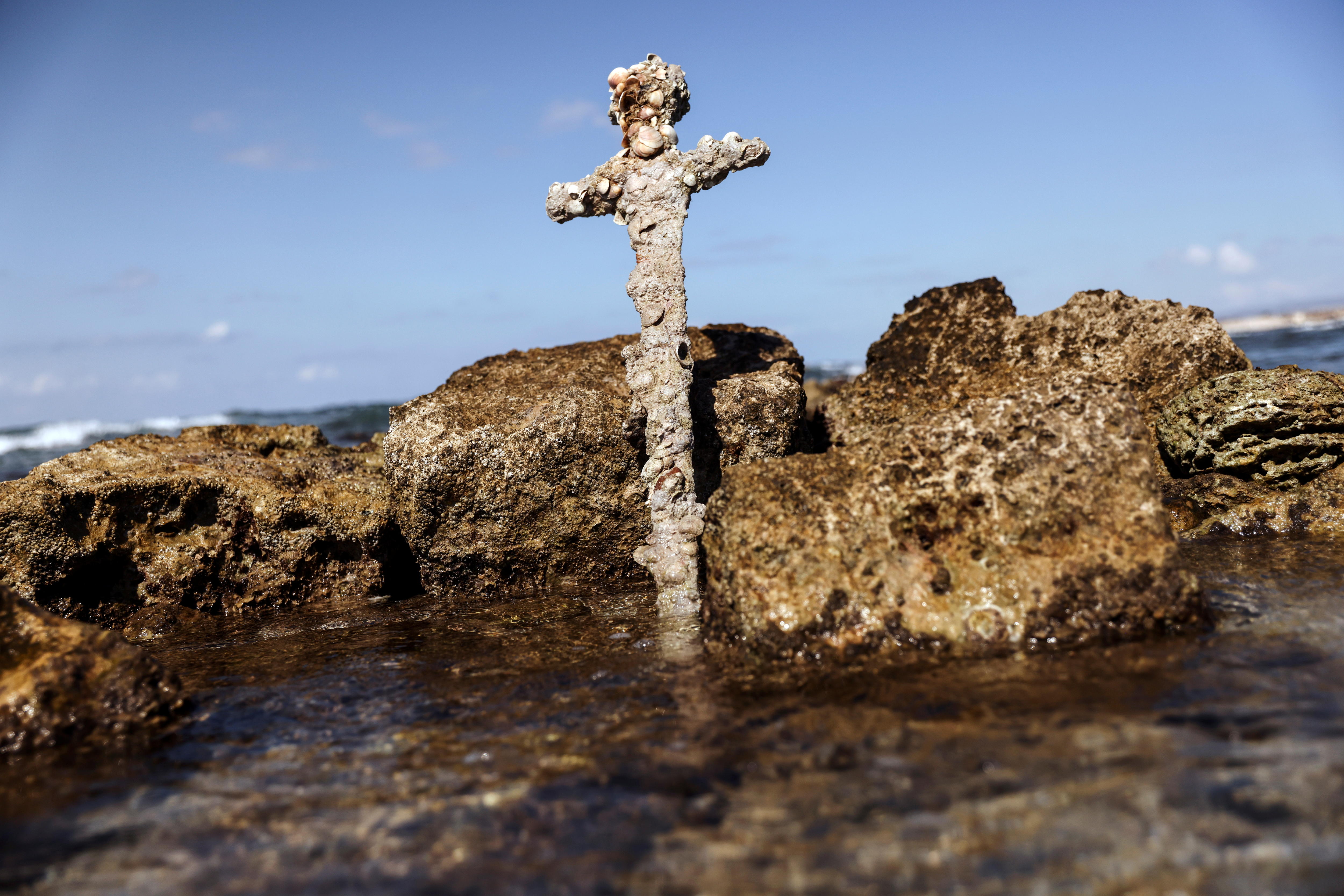 Amateur diver recovers 'crusader sword' from Mediterranean seabed - ABC ...