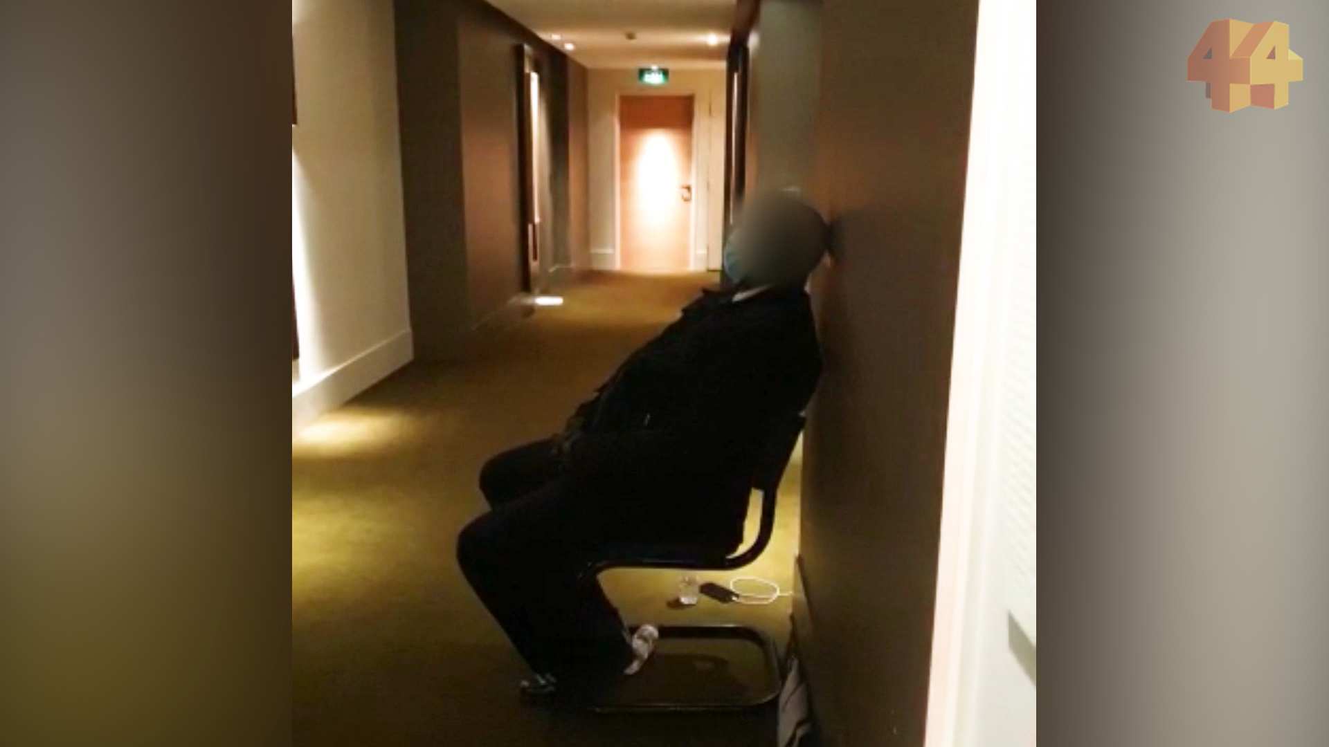 A security guard filmed sleeping in a corridor at a Melbourne hotel ...