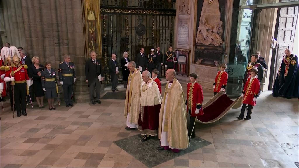 King Charles enters Westminster Abbey with regalia - ABC News