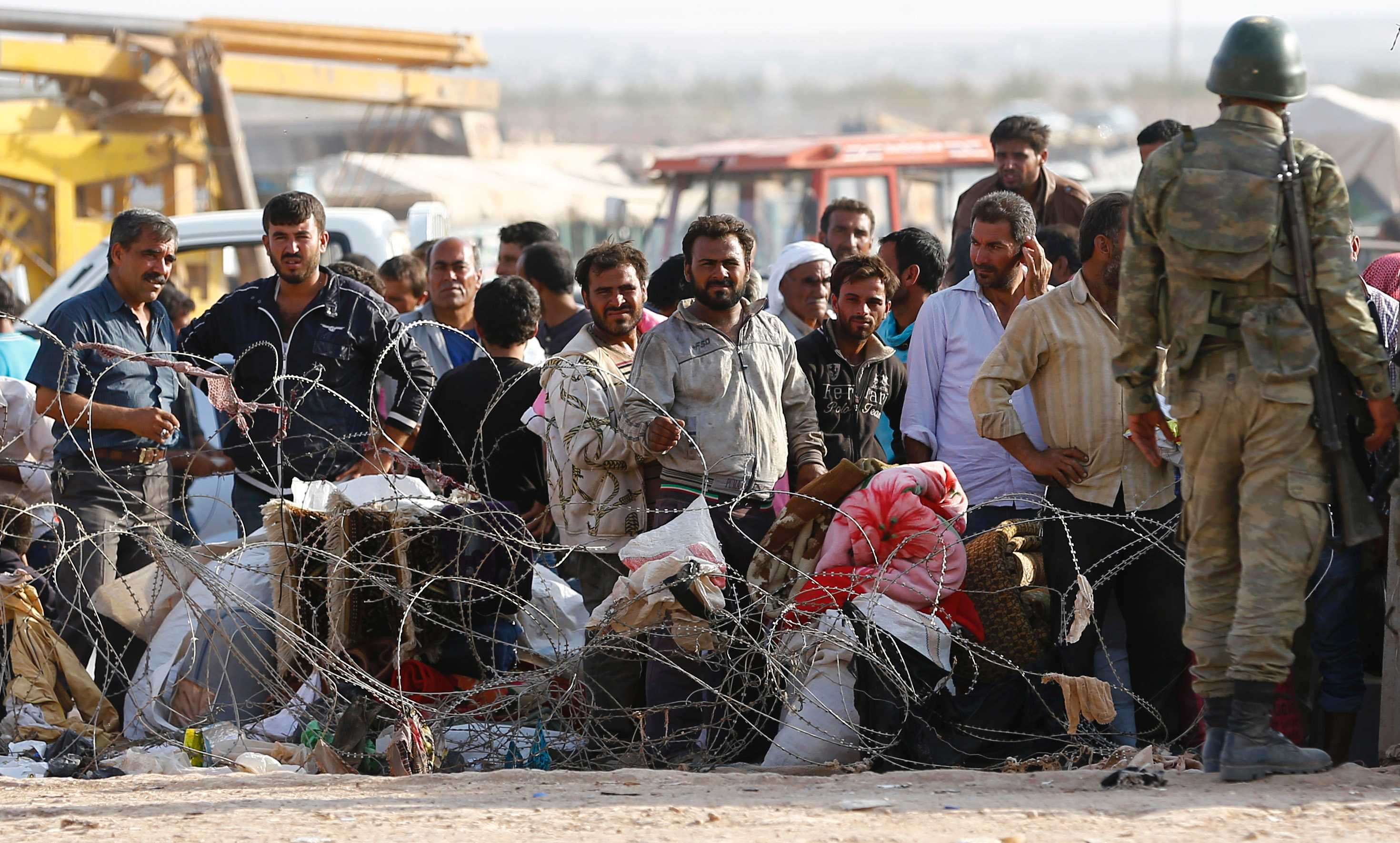 Islamic State: Kurdish refugees vow to defend Syria-Turkey border town ...