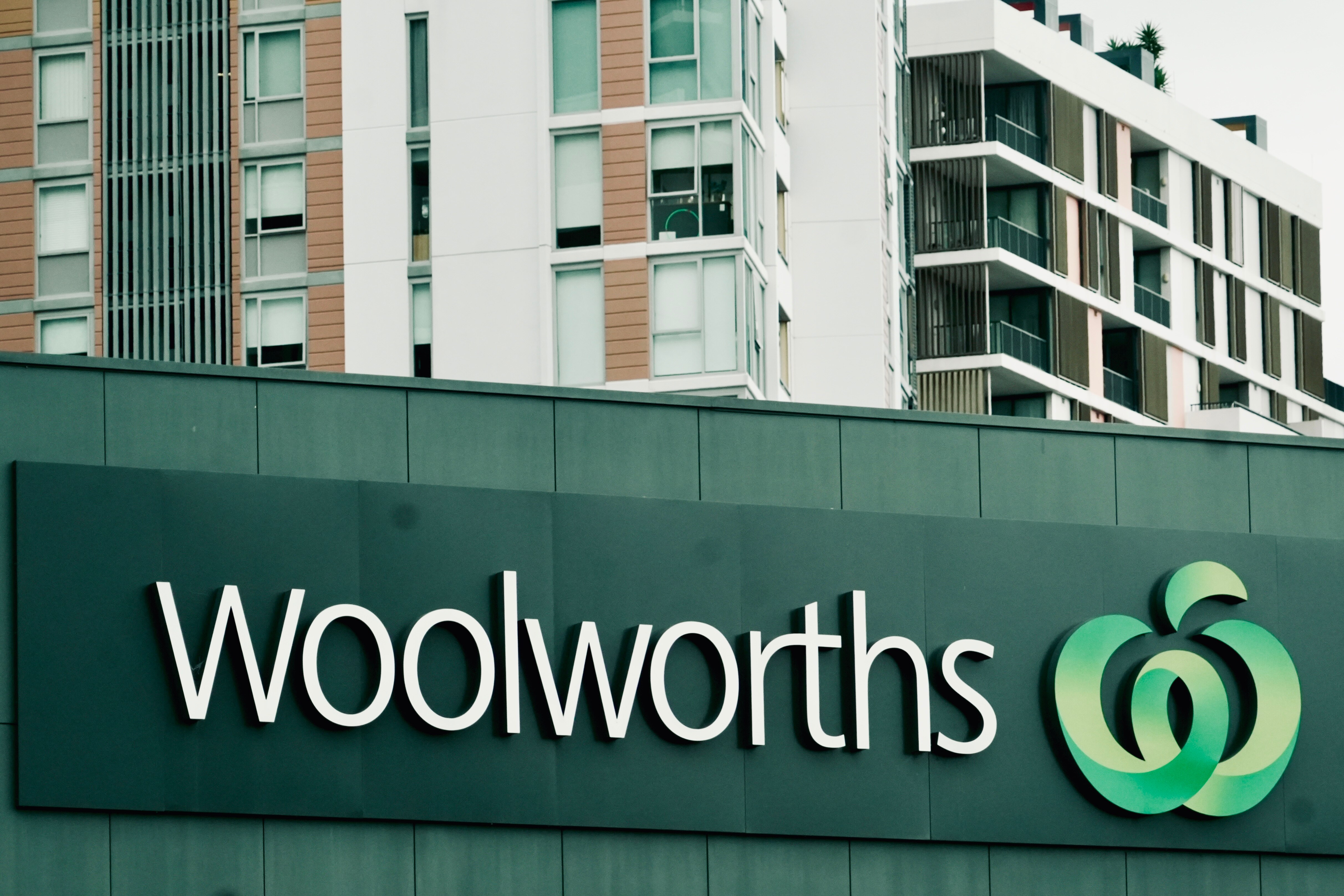 Woolworths plans to cut office jobs and products as earnings hit by ...
