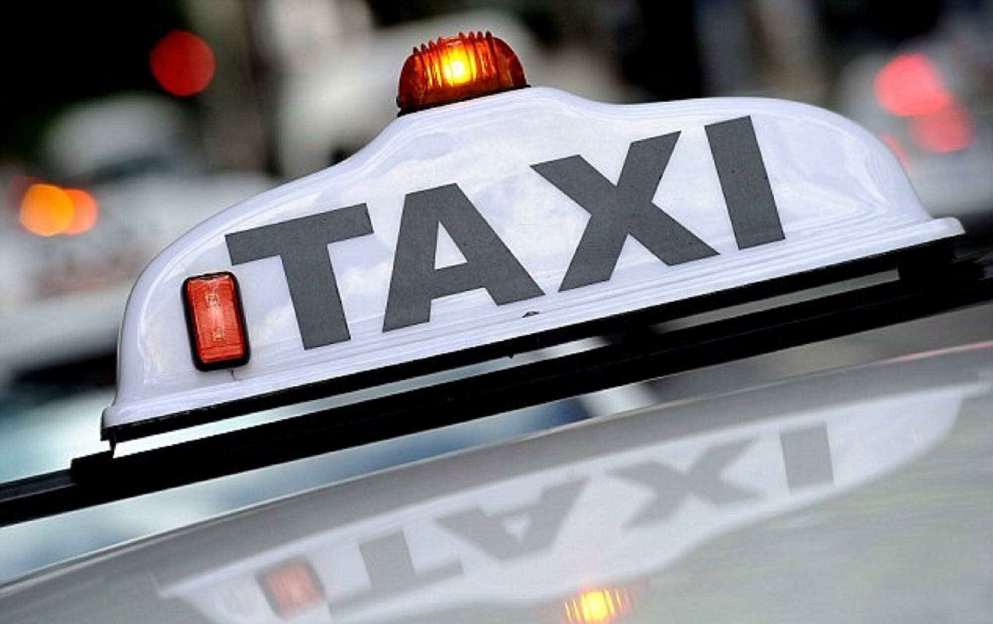Taxi operators demand more compensation for plates, saying current ...
