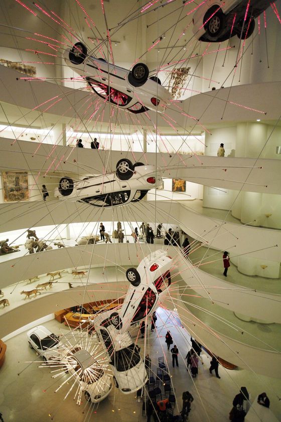 Artist's exploding cars take over Guggenheim - ABC News