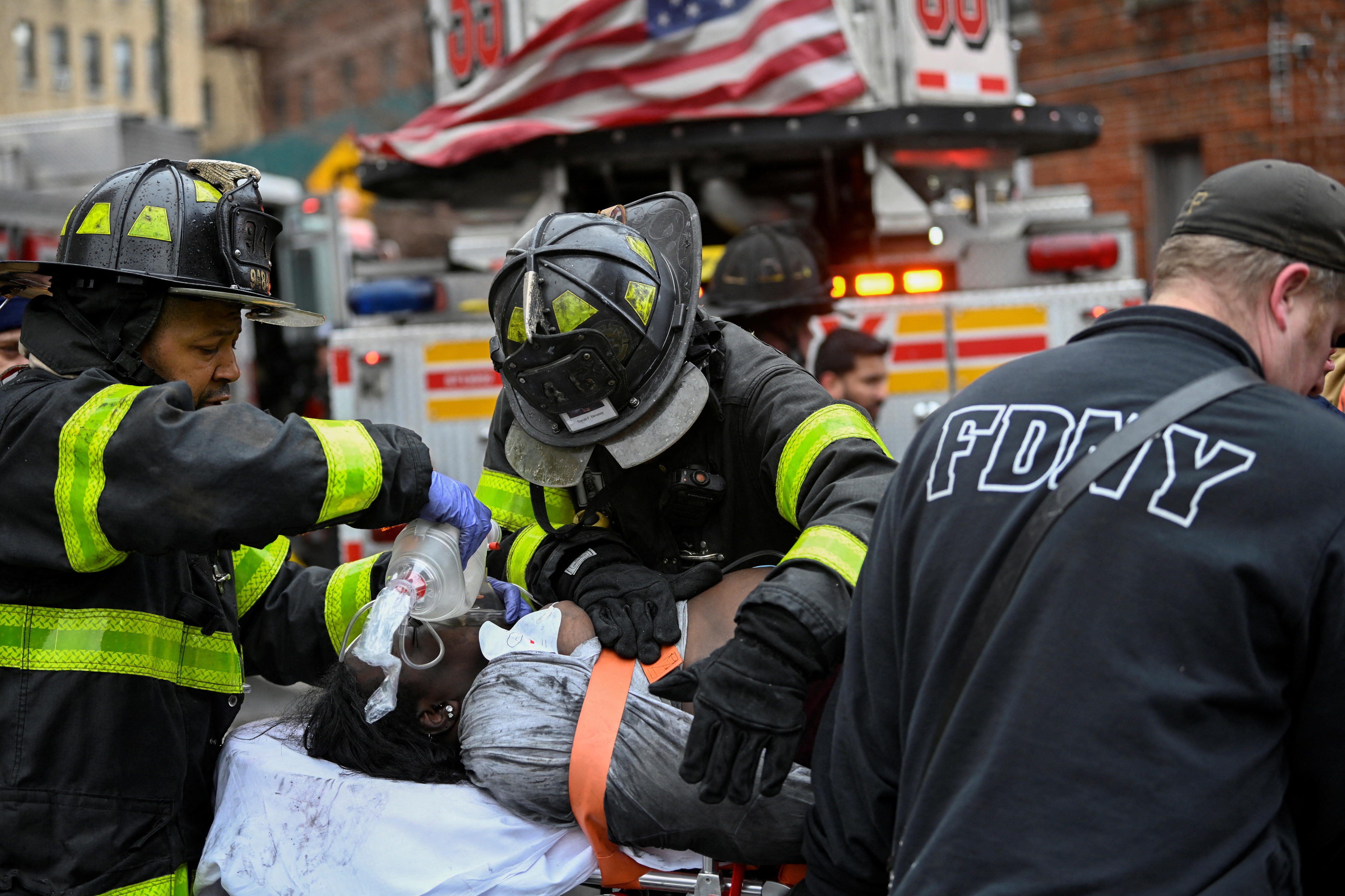 At least 19 people killed in apartment building fire in New York City ...
