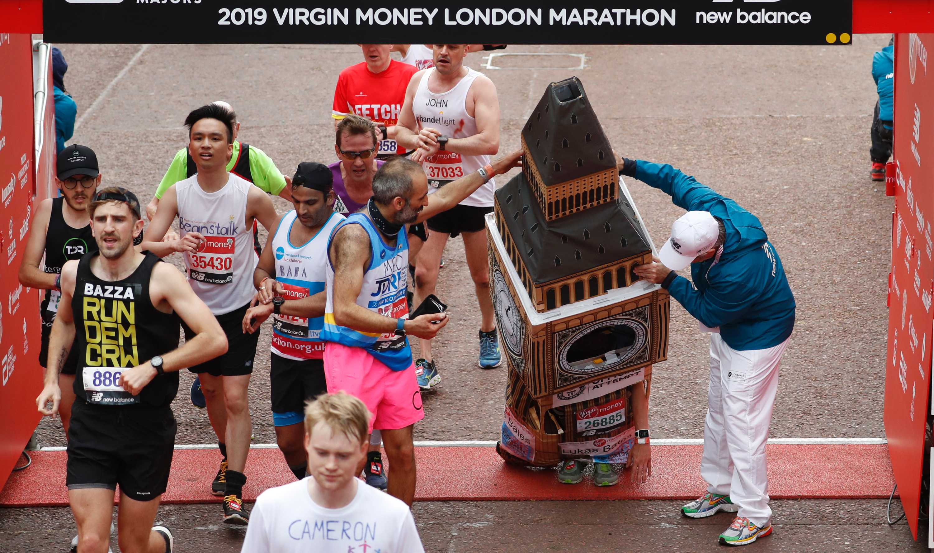 Big Ben crashes London Marathon finish, delight for Kipchoge, Kosgei ...