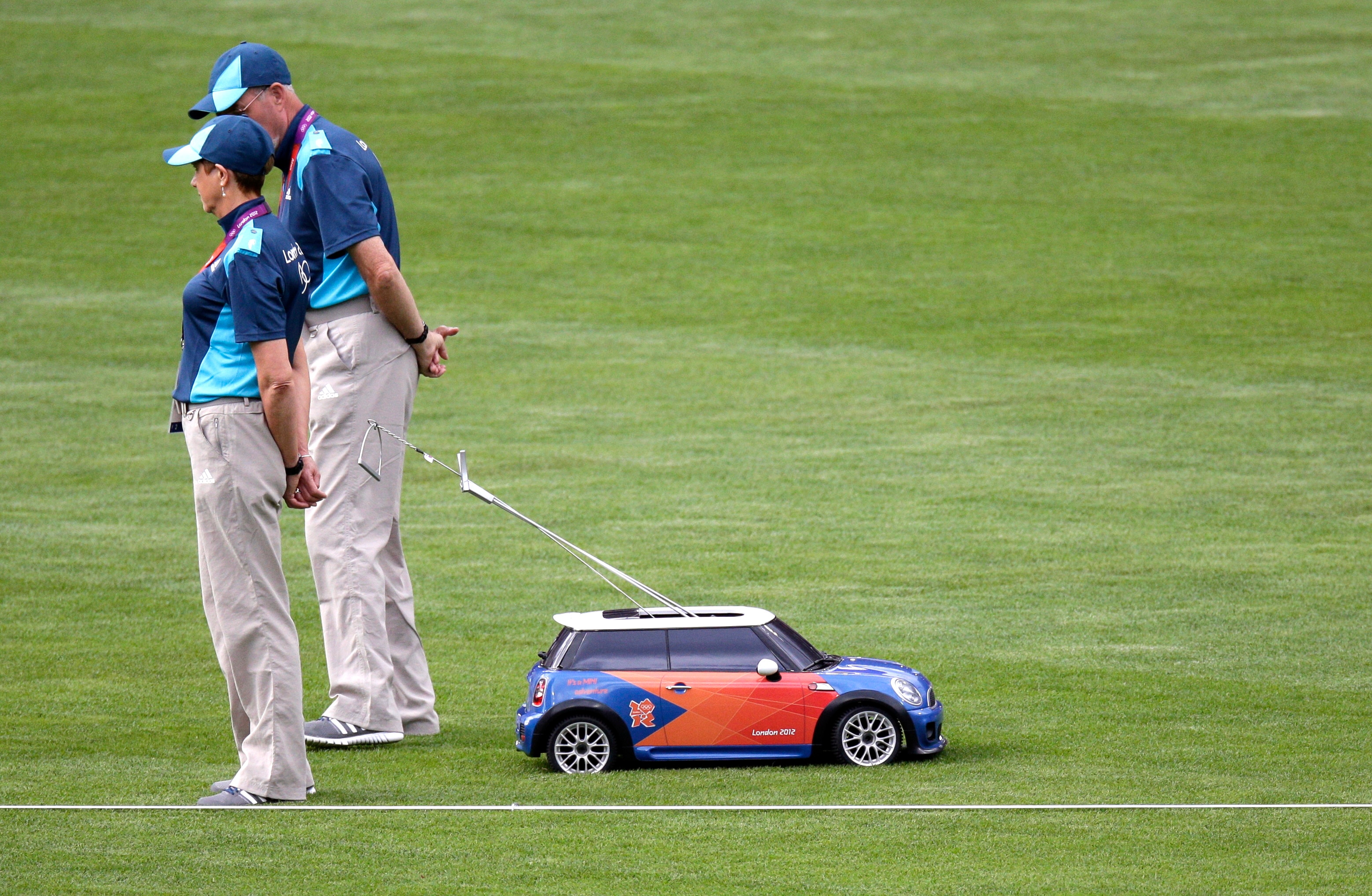 What are the little remote controlled cars on the field at the Olympics ...