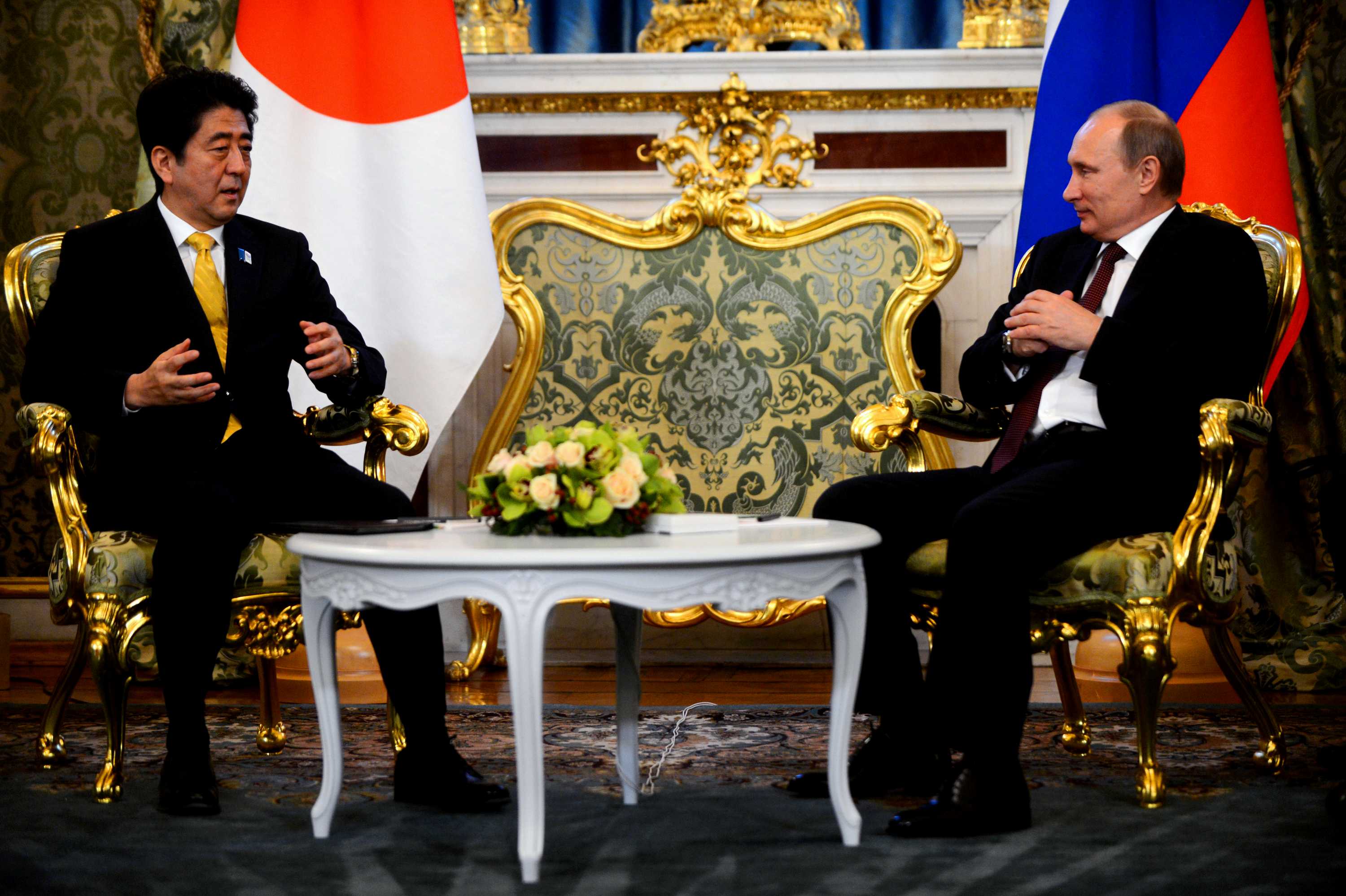 Japan PM, Putin seek progress on islands dispute - ABC News