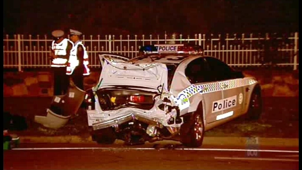 Car crashes into cop car - ABC News
