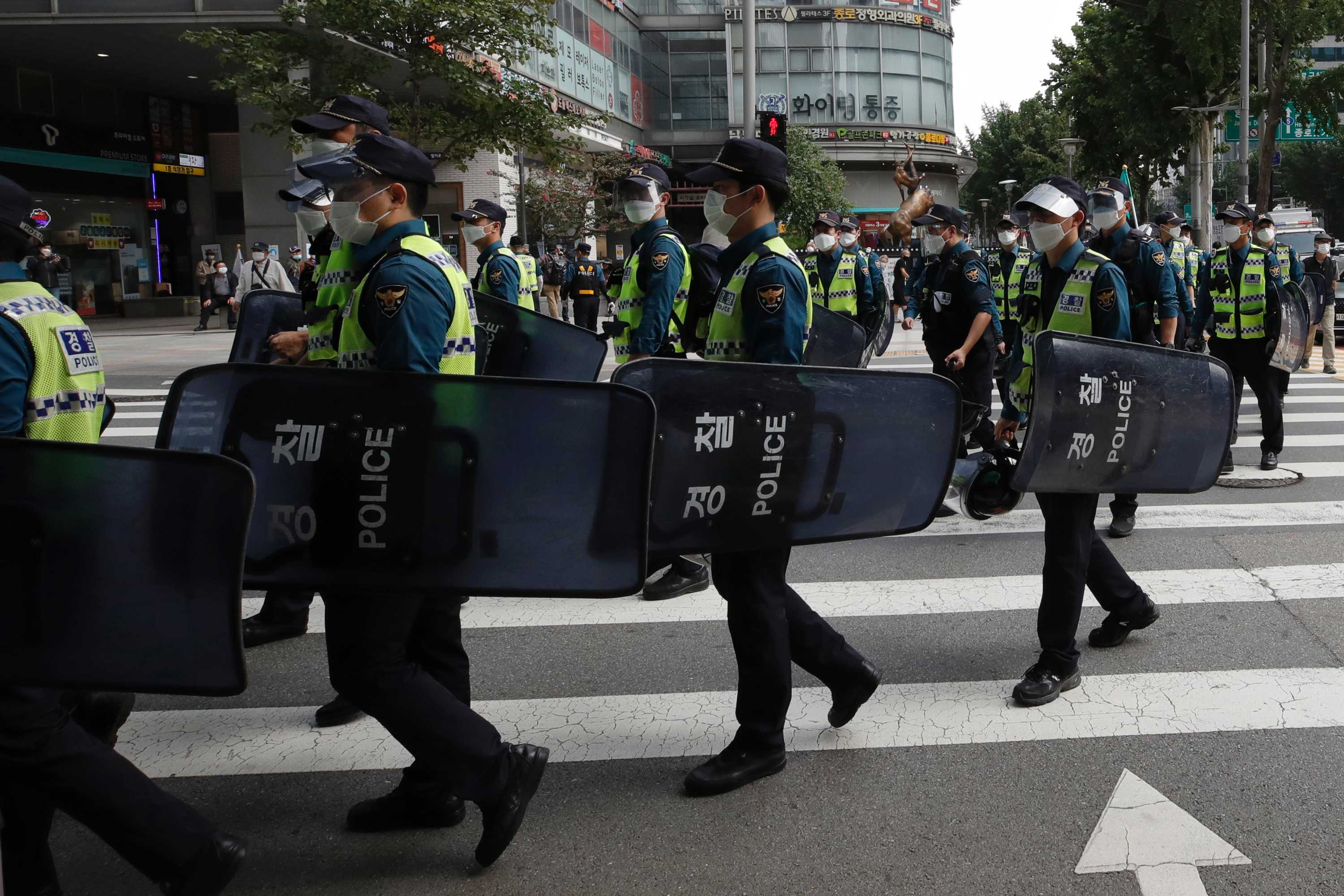 COVID-19 concerns see South Korea police wall off protest square with ...