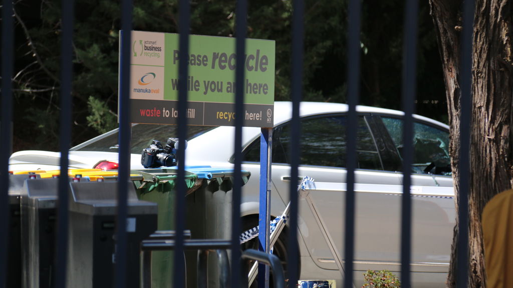 Sergeant Simon Coady announces a man is in custody after a woman was ...