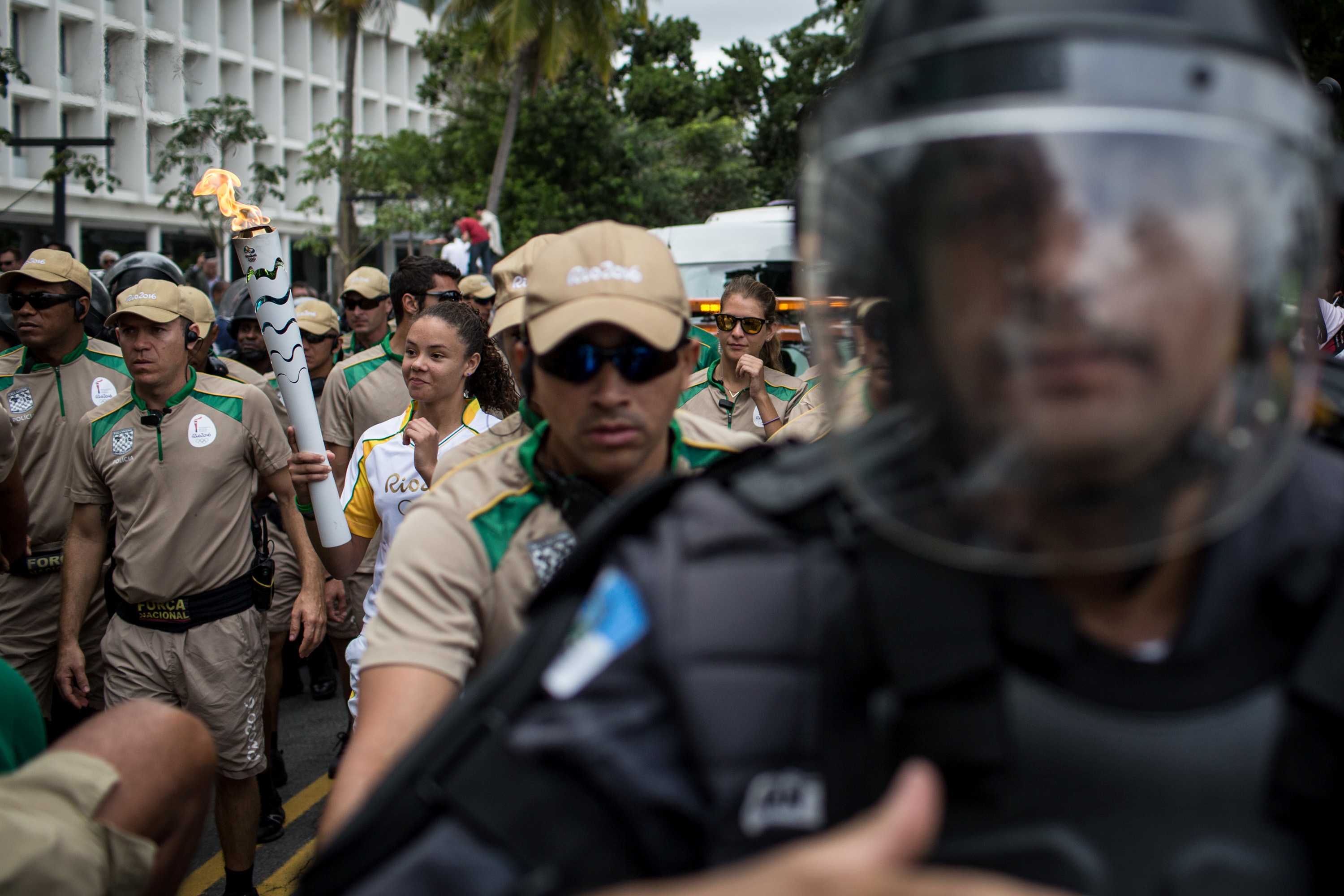 Rio 2016: Torch relay arrives in host city as Olympic fever grips the ...