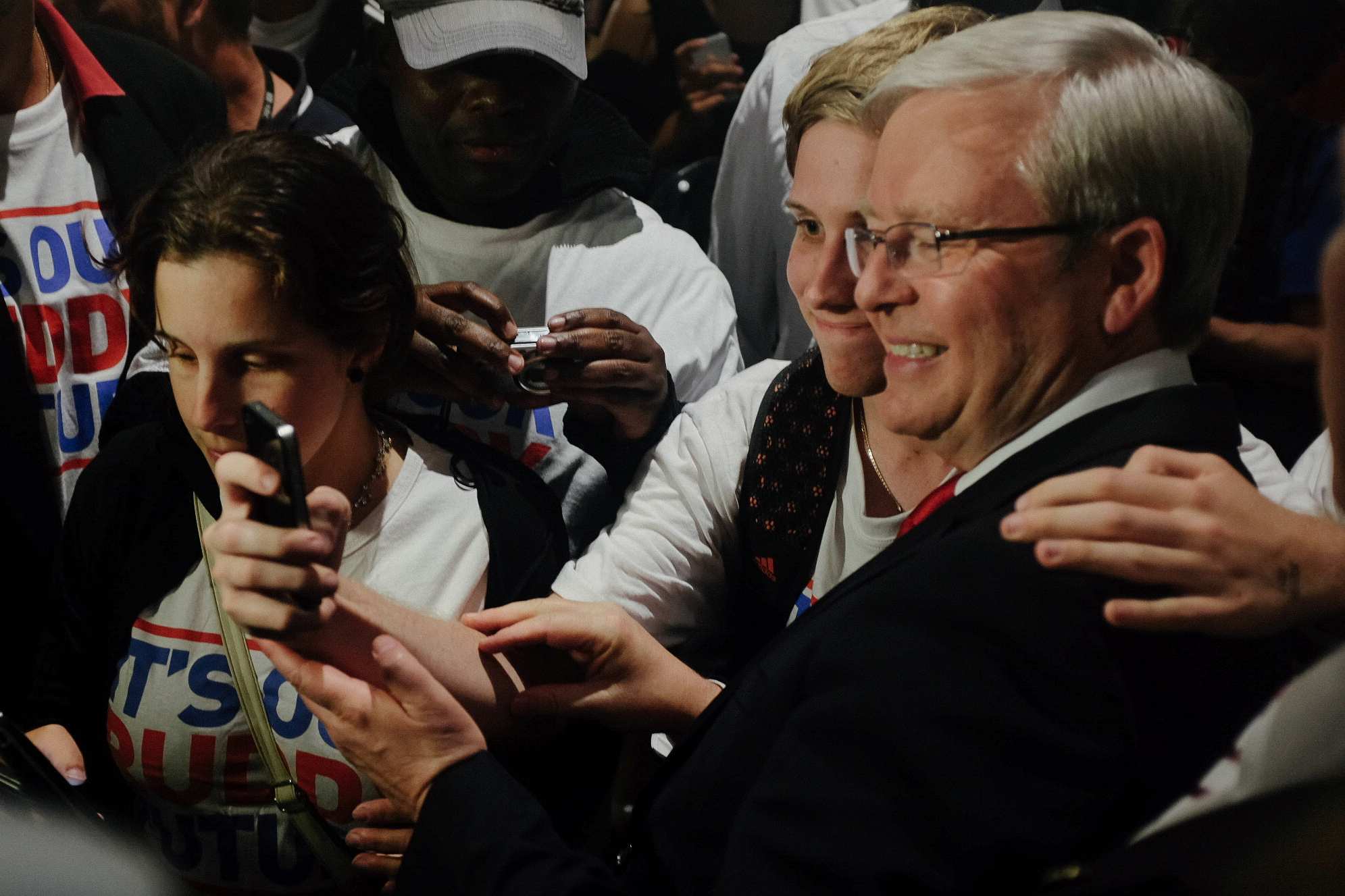 Former prime minister Kevin Rudd surrounded by ecstatic supporters on ...