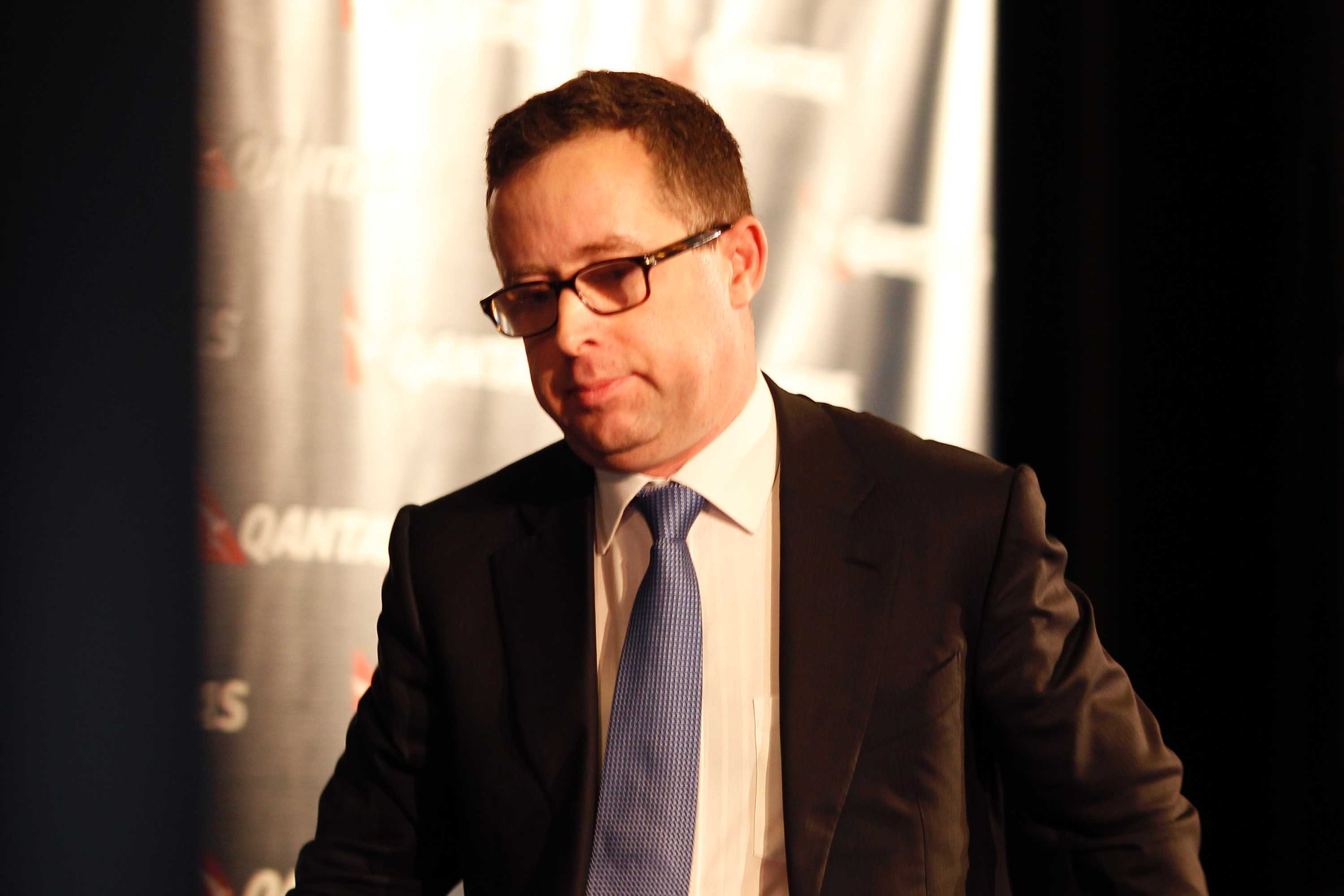 Qantas chief Alan Joyce vows to stay on despite losses, job cuts - ABC News