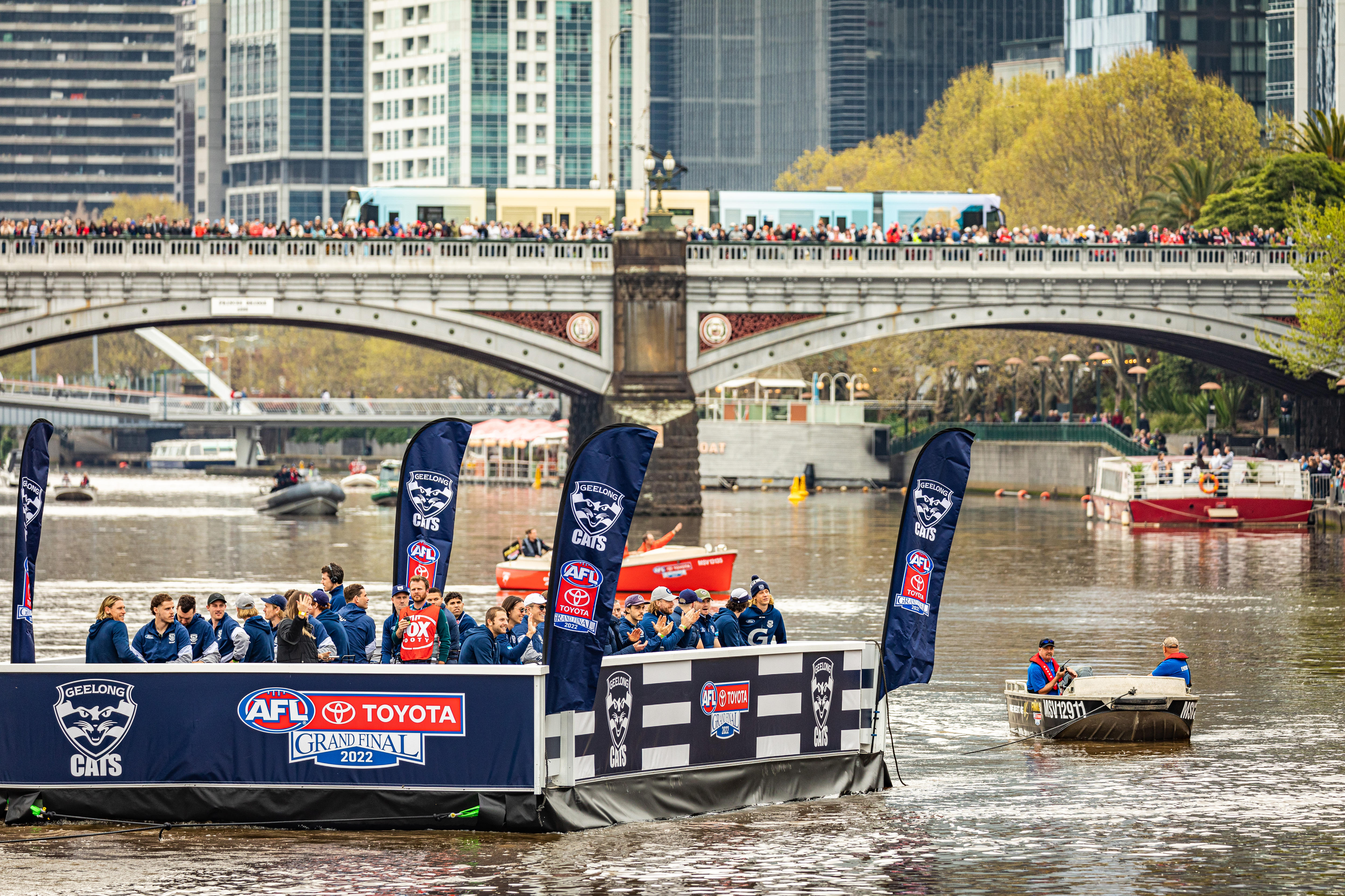 AFL grand final parade sees Cats and Swans take to Yarra River, but not ...