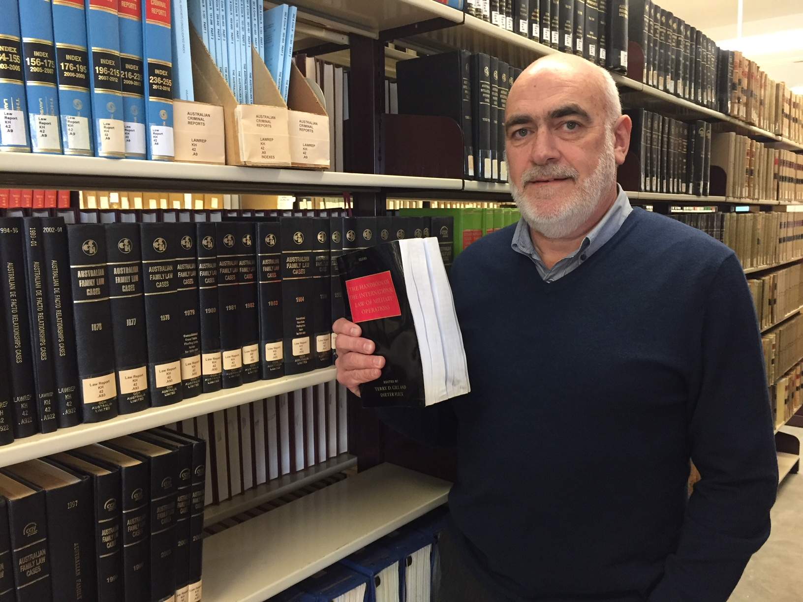 UTAS tries to save hundreds of rare flood-damaged law books by having ...