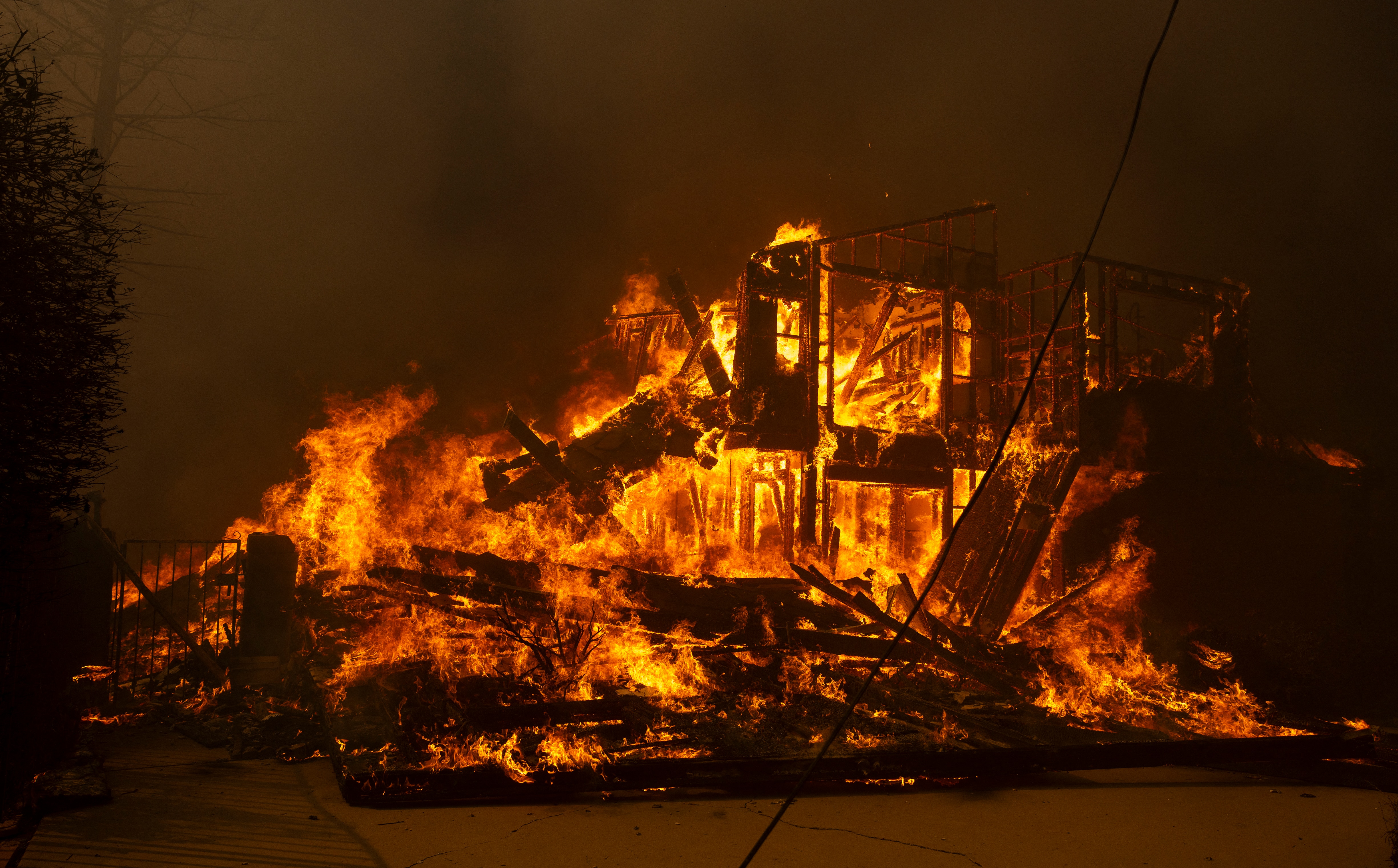 California wildfires destroy more than 130 homes as governor declares ...