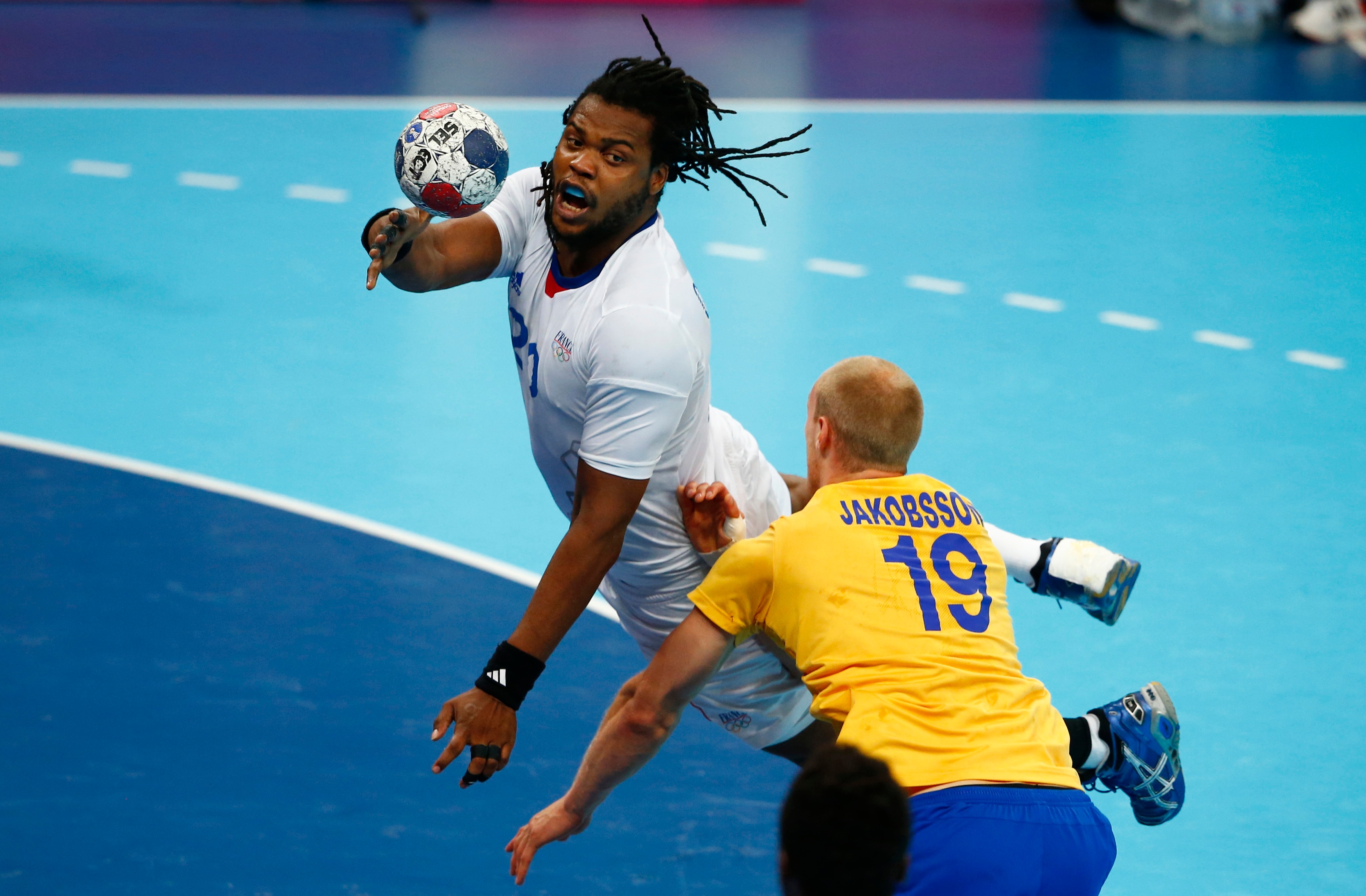 France retains men's handball title - ABC News