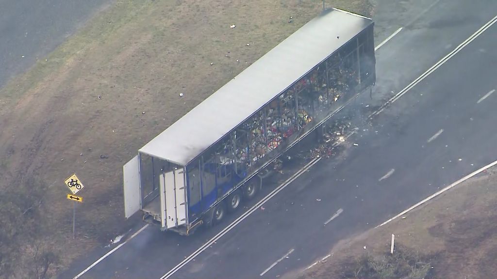 A loaded truck trailer was burned as fires approached Wallangarra yesterday. - ABC News