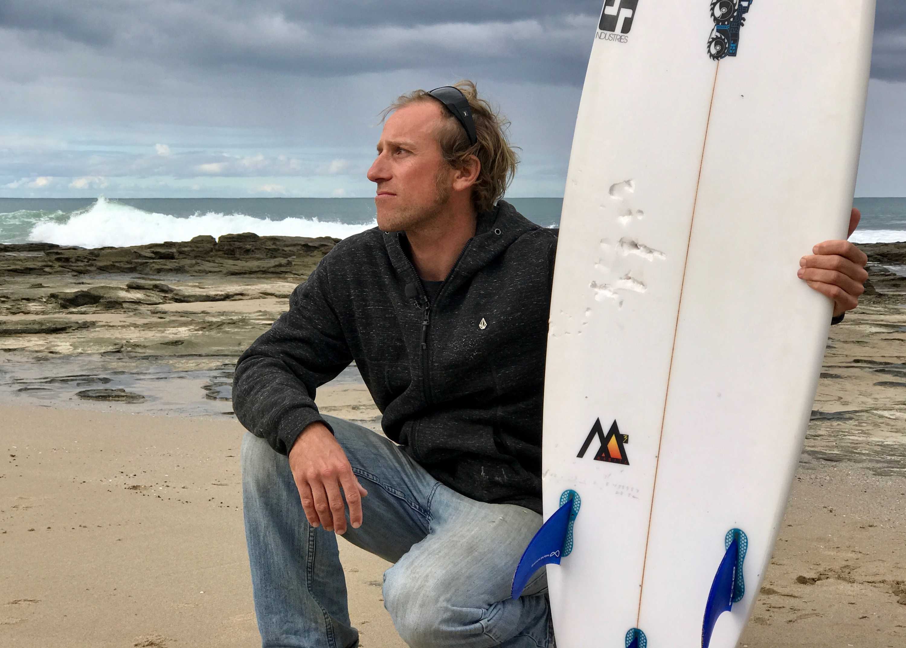 Surfer fends off white pointer shark with board near Lorne on Victoria ...