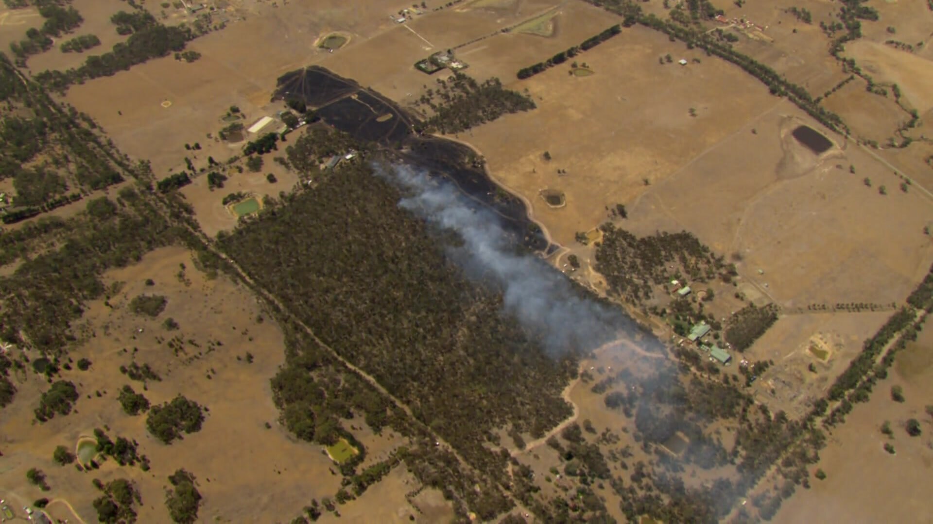 Fires flare north of Melbourne in hot, windy conditions - ABC News