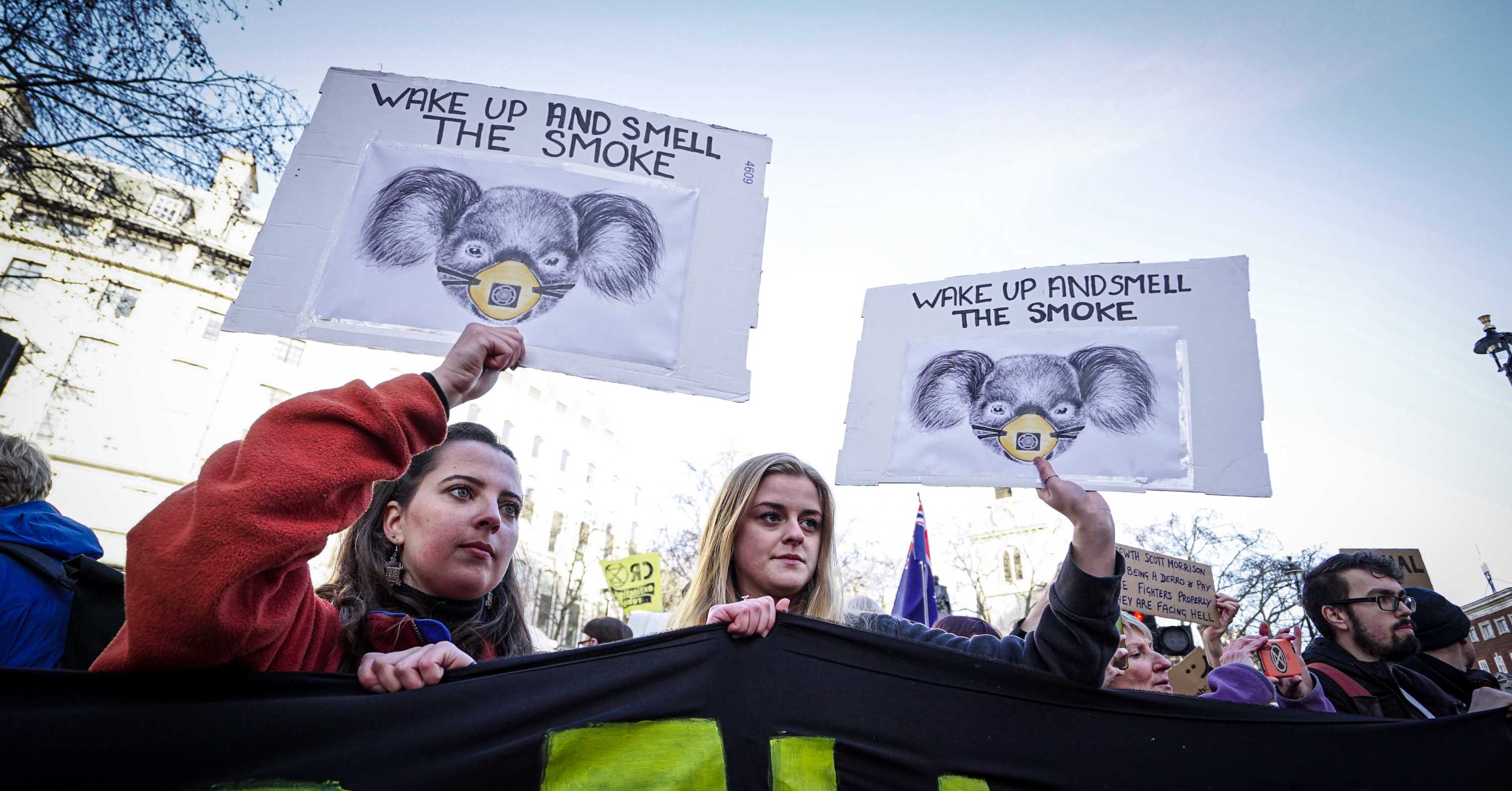 Climate action protesters angry over Australia's bushfires rally across ...