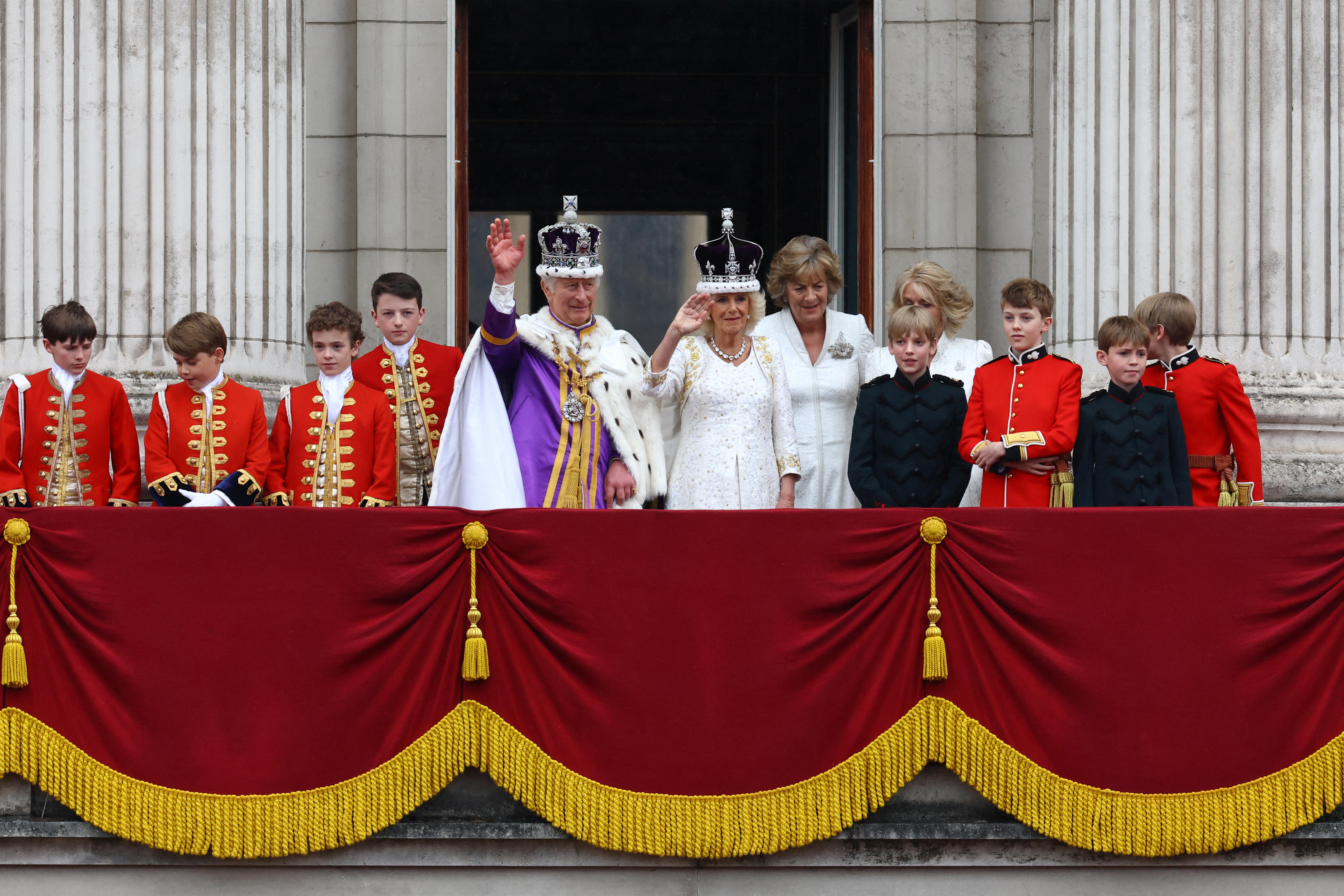Coronation updates: King Charles III and Queen Camilla join royals on ...