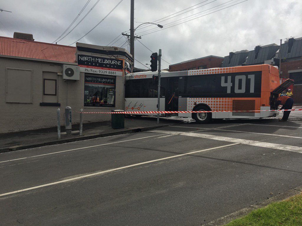 Bus crashes into takeaway shop in North Melbourne - ABC News