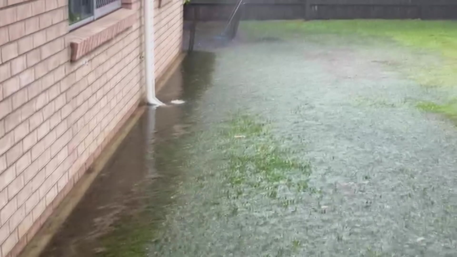 Heavy rain fell at Bec Tardent's home in Parklands in the Noosa region ...