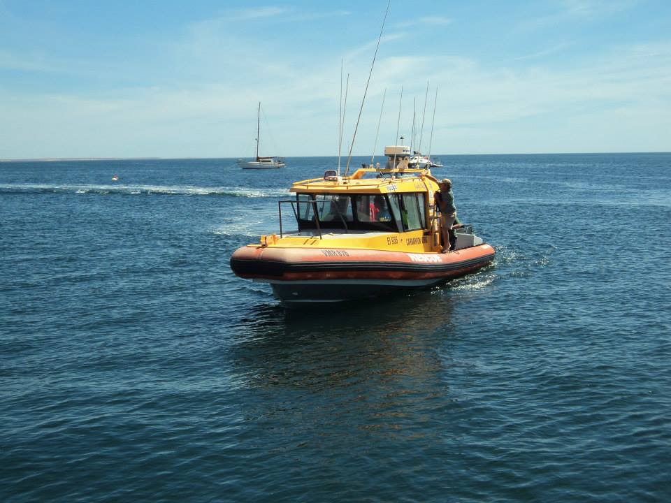 Crew rescued from stranded trawler aground on reef off Carnarvon in ...