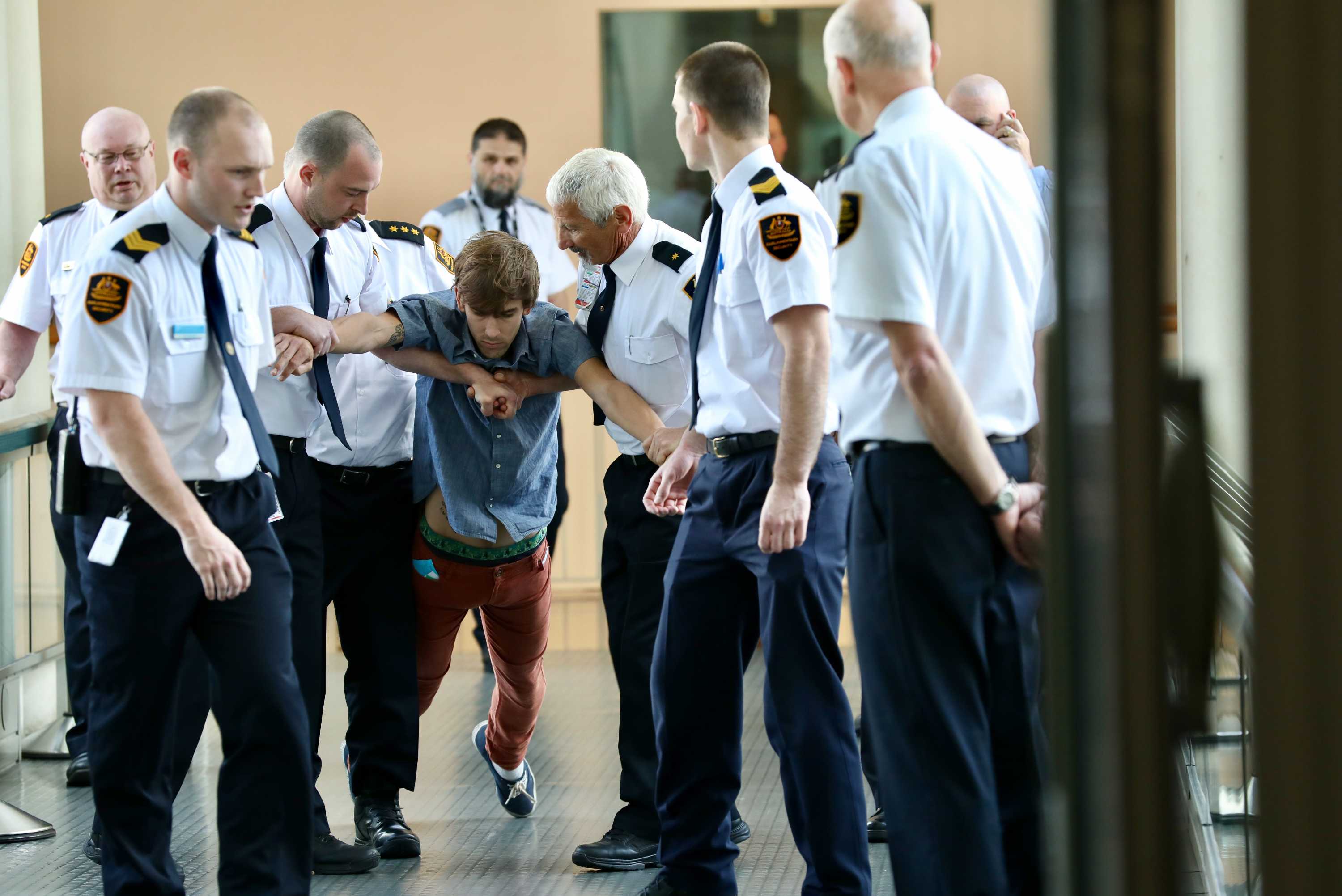 Question Time protesters who superglued themselves to Parliament ...