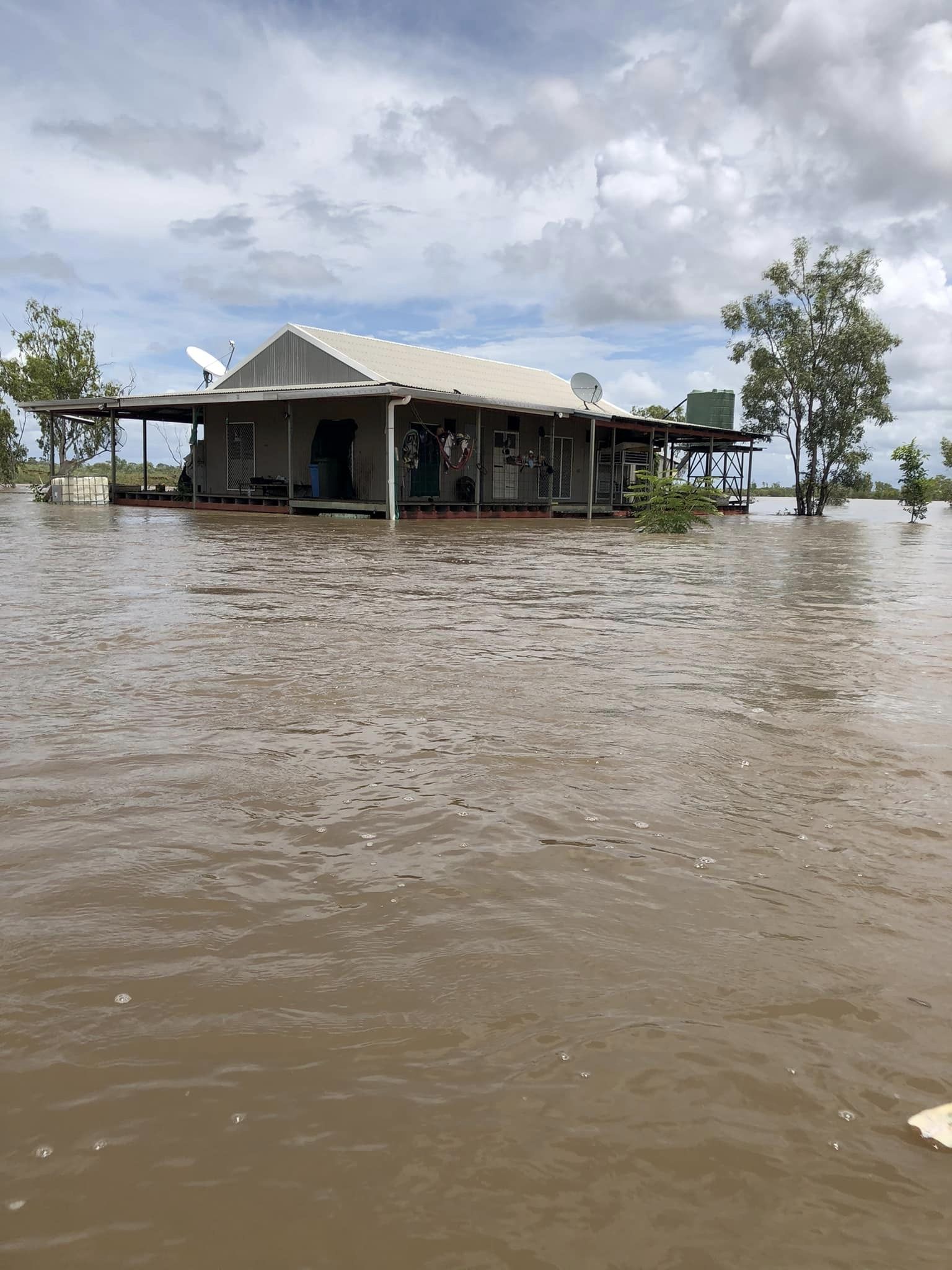 Calls for aid in Doomadgee, residents face weeks trapped by floodwater ...