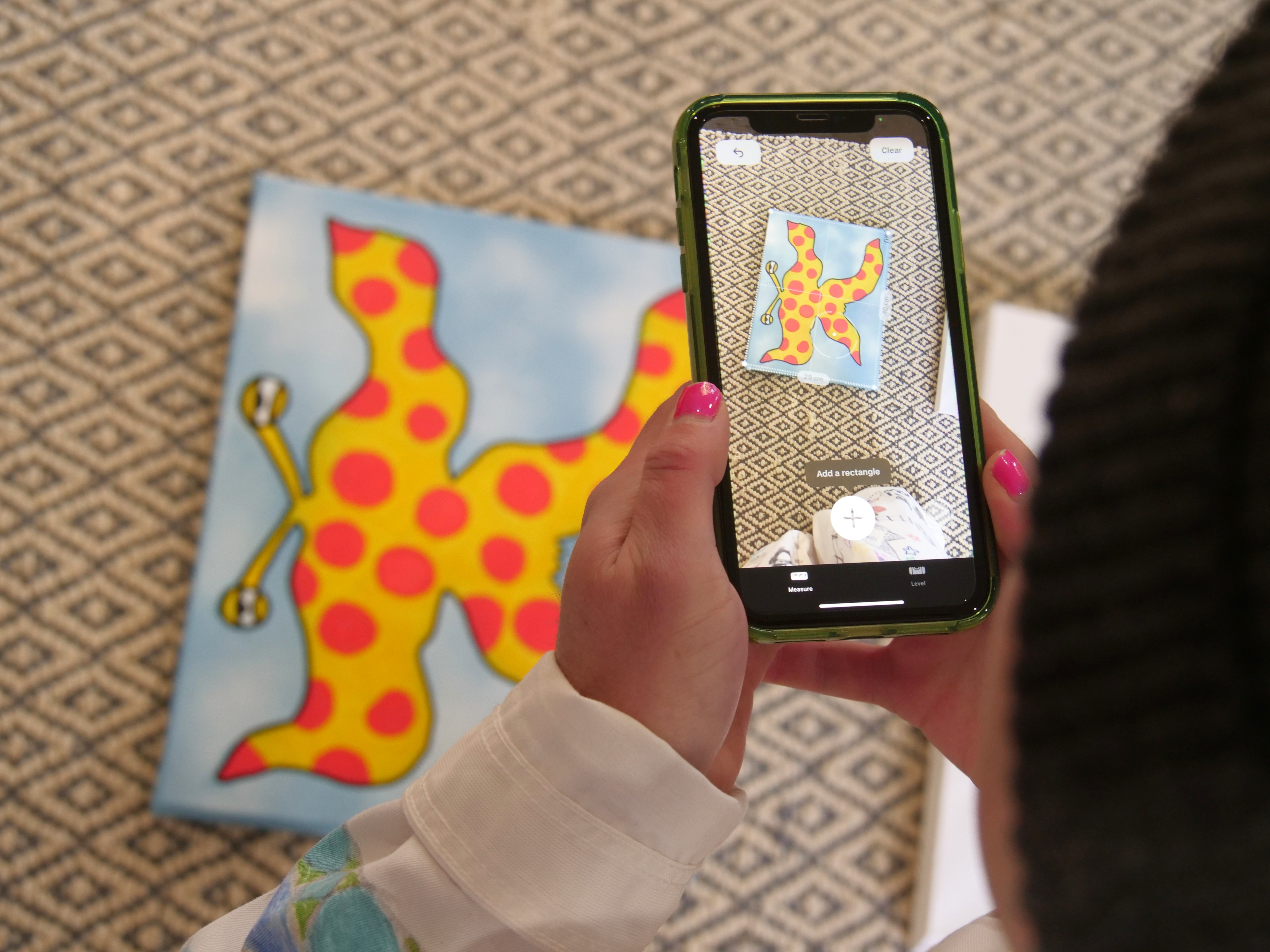 Tasmanian artist Alfie Barker has dyscalculia, which he describes as ...