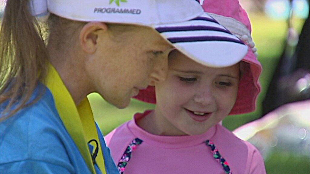 Childhood cancer survivor Georgia Lowry gives hope to younger patients ...