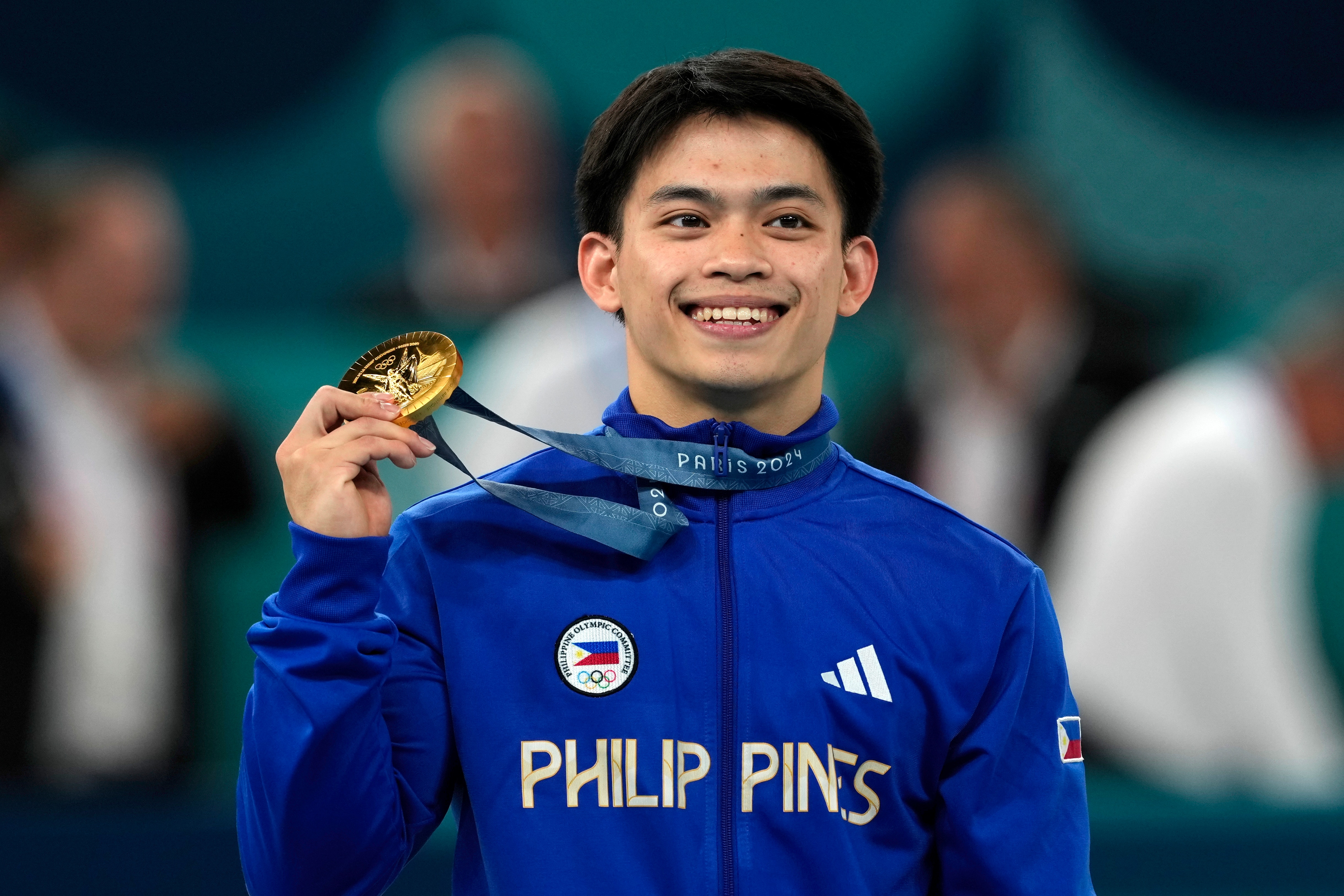 Carlos Edriel Yulo wins historic gold for Philippines with floor ...