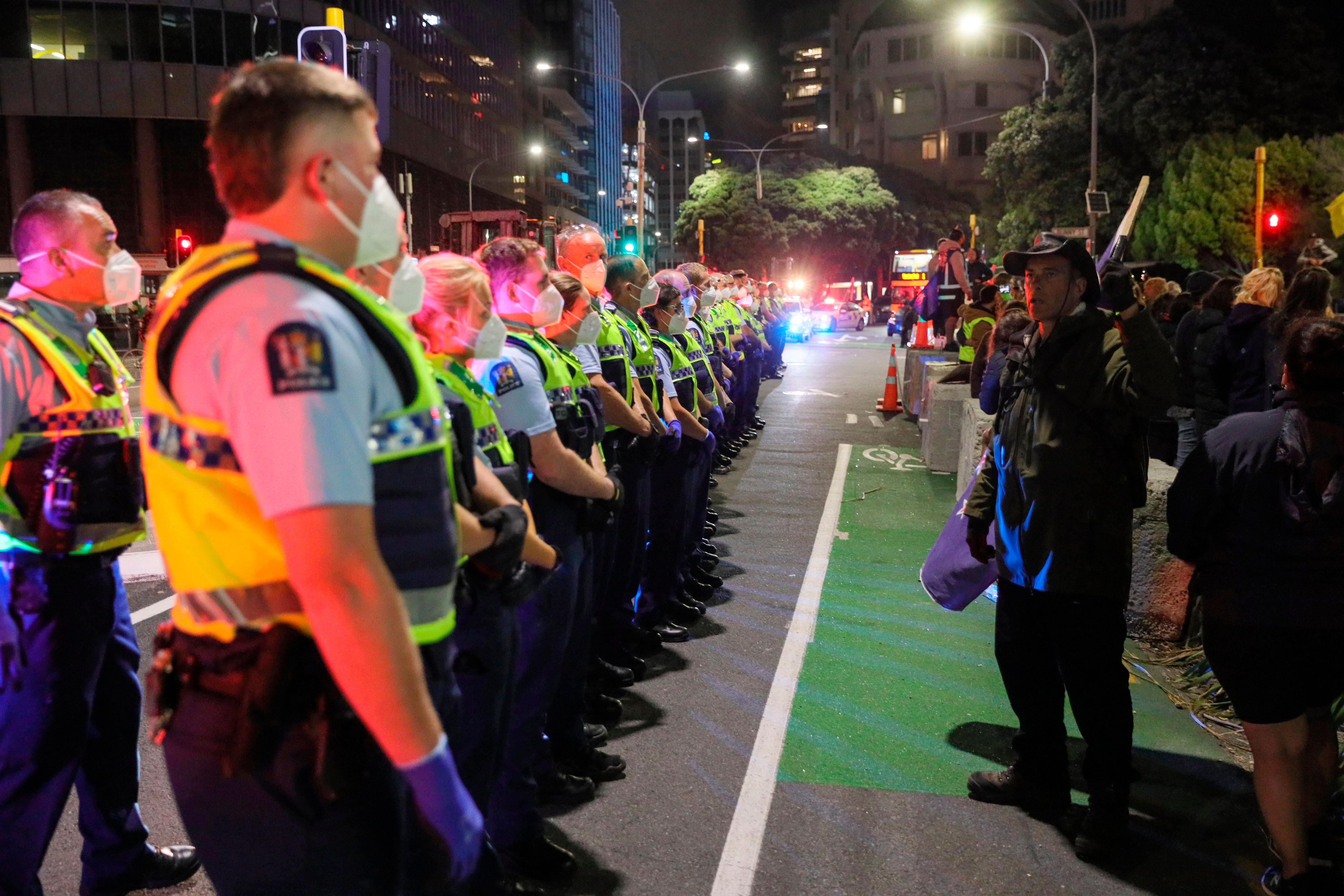 Wellington protesters against COVID vaccine mandates set fires as NZ ...