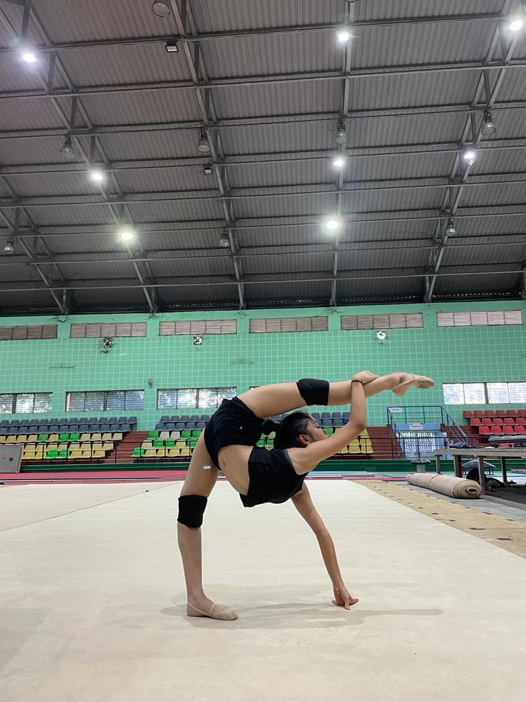How a promising rhythmic gymnast is learning the tricks of the trade by ...