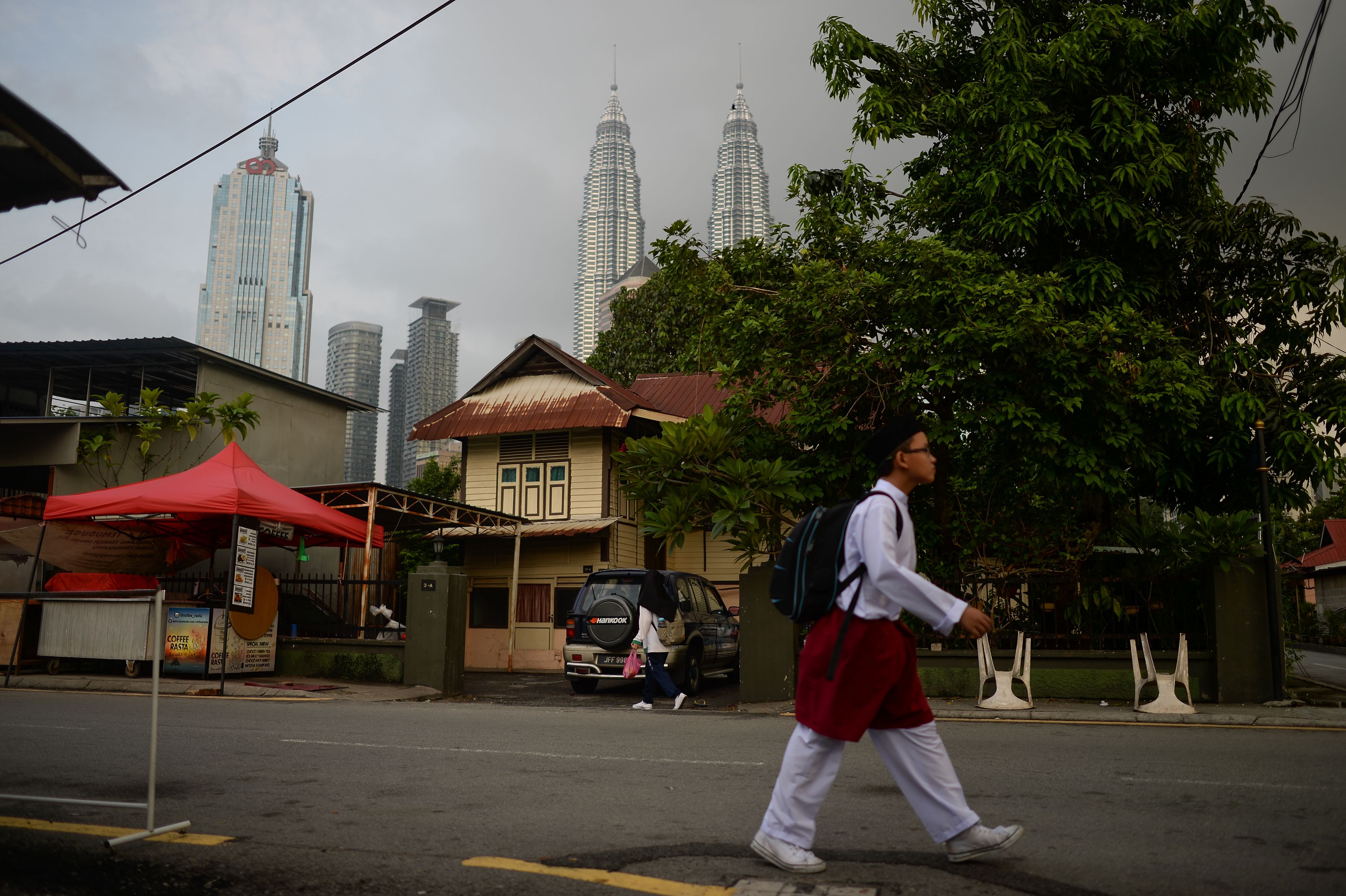 Kampung Baru survives as a slice of village life in the middle of one ...