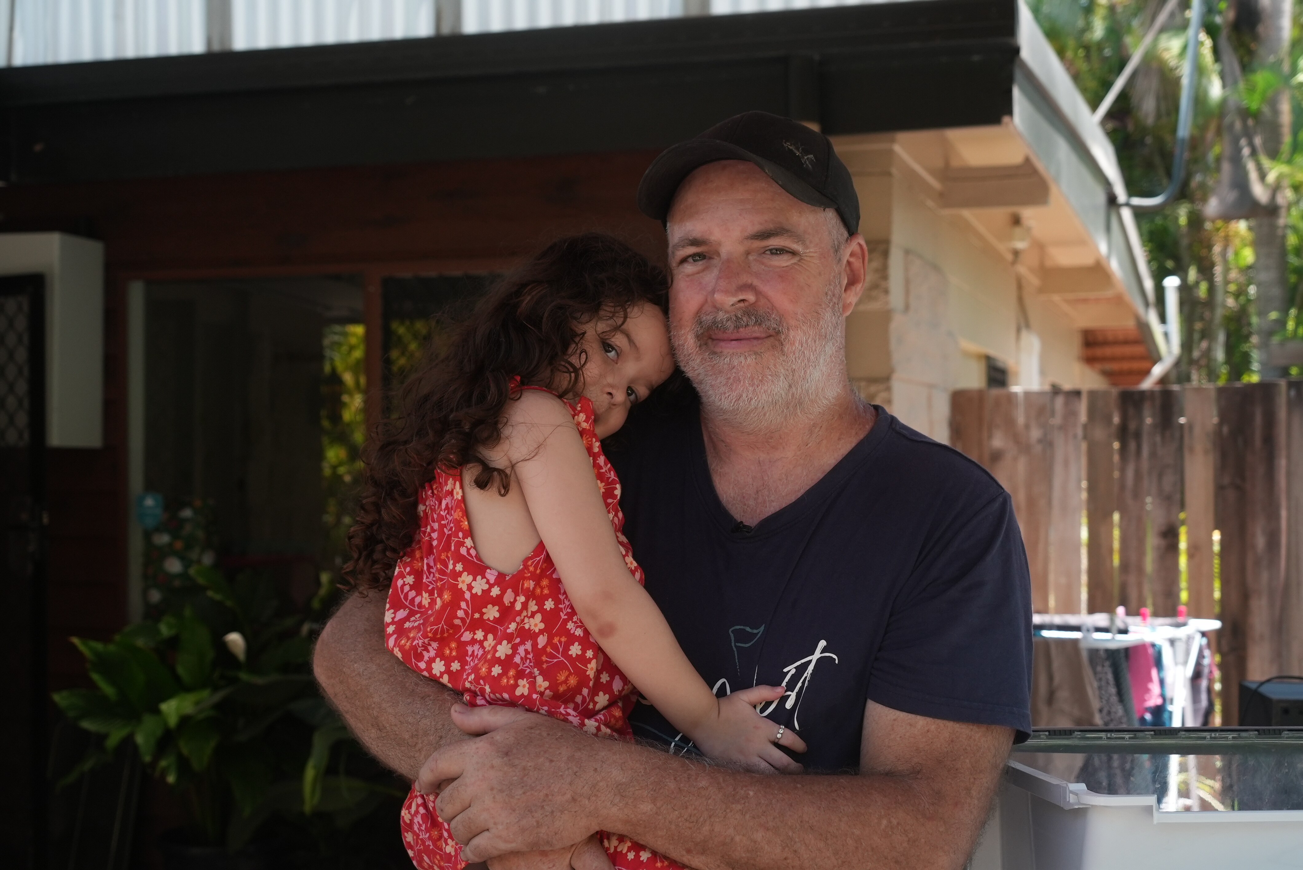 Thirsty south-west carpet python stretches out for water in WA garden ...