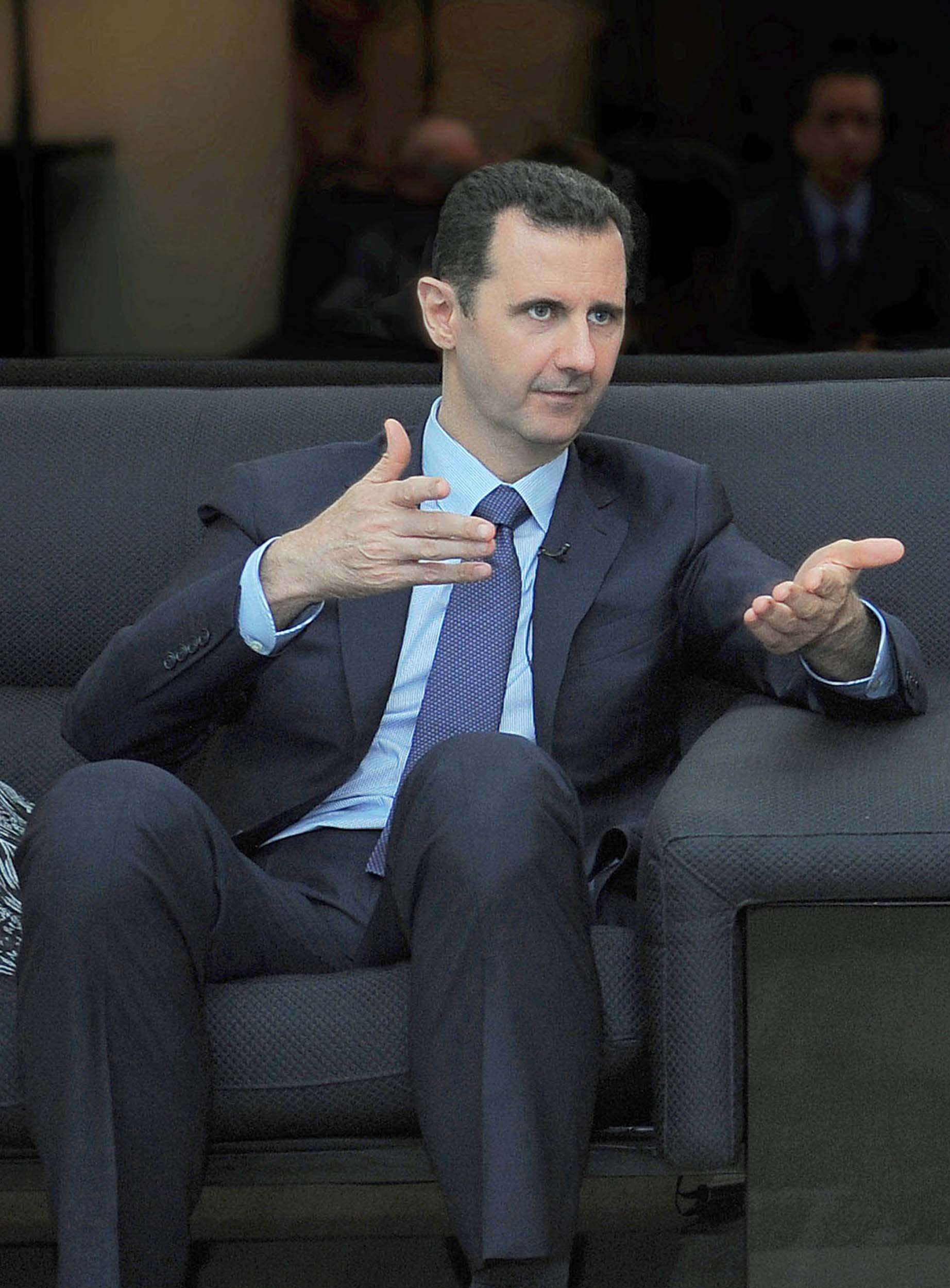 Assad vows to hand over Syria's chemical weapons, US hold talks with ...
