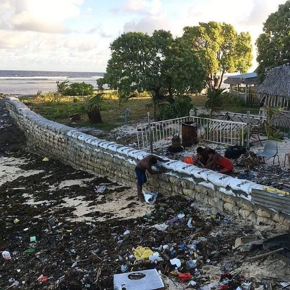 Rising sea levels were beginning to swallow Teaote's home on Kiribati ...