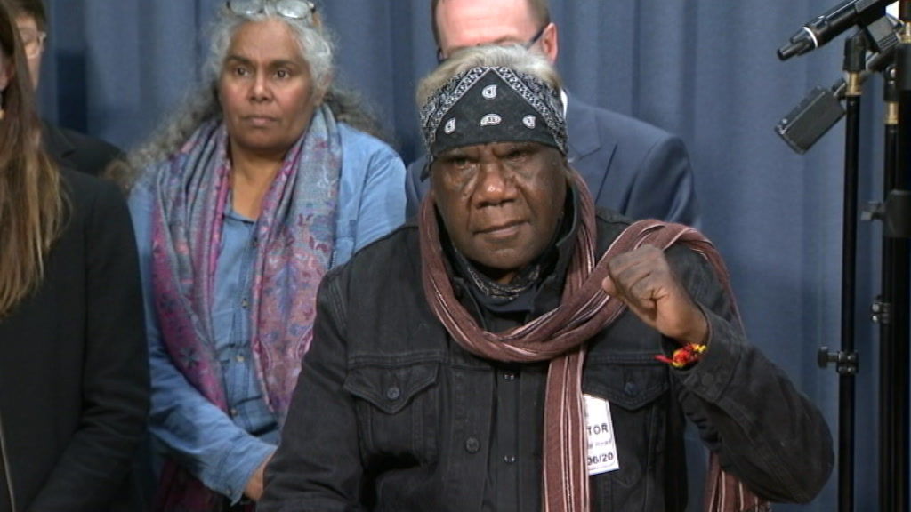 The boy's father takes a knee in support of George Floyd's family - ABC ...