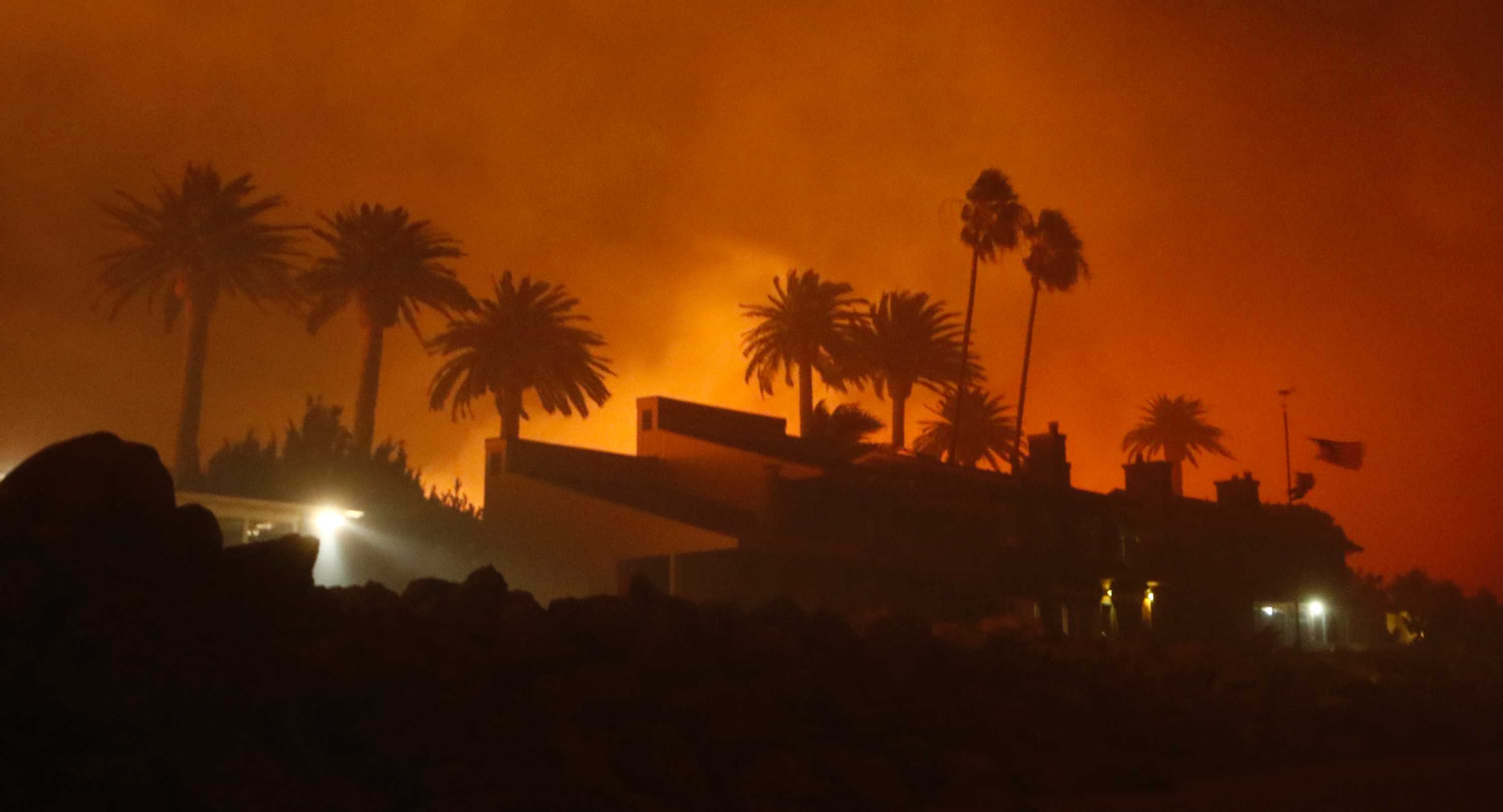 Winter wildfire rips through Southern California, forcing evacuations ...