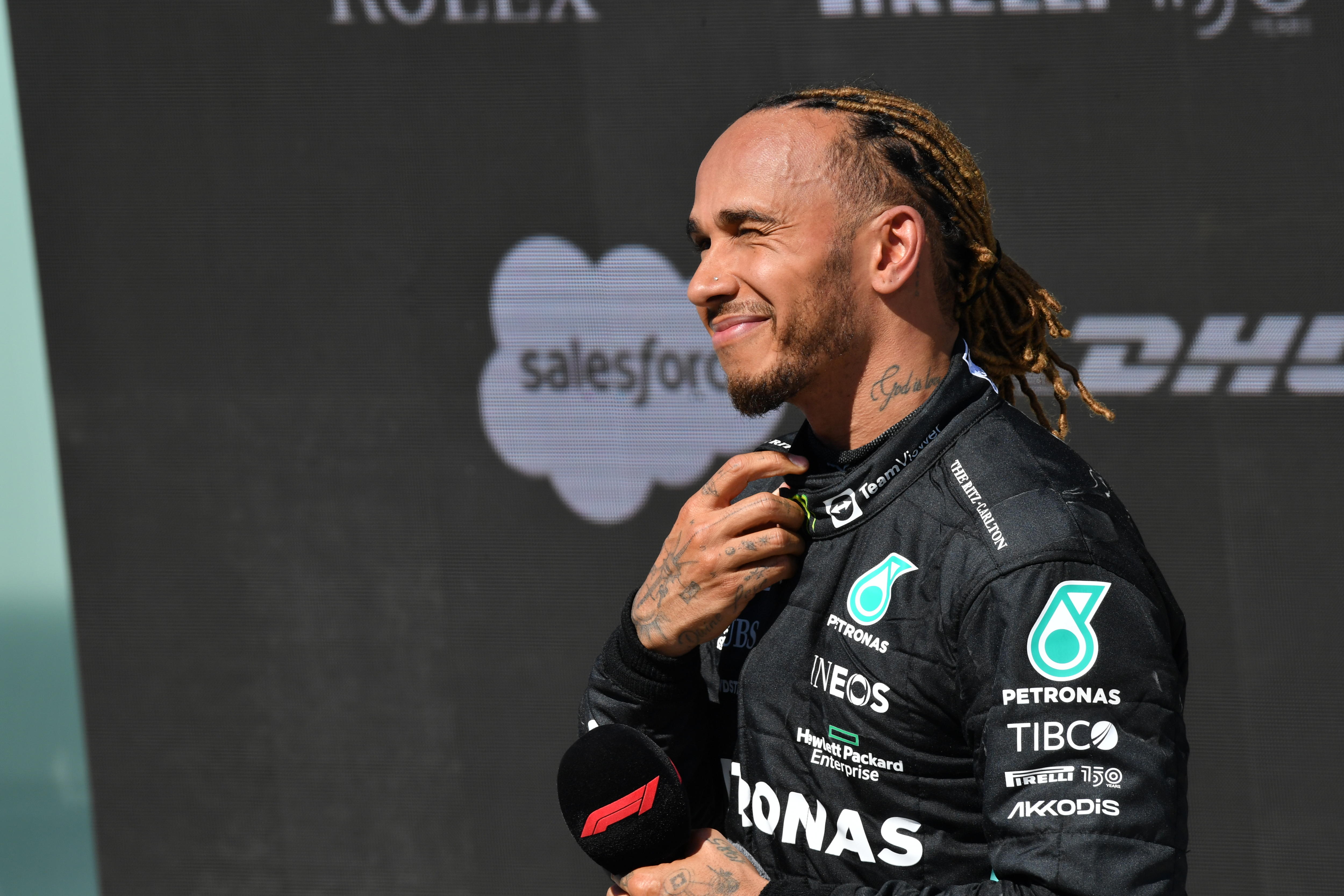 Formula One condemns racist language, defends Lewis Hamilton after ...